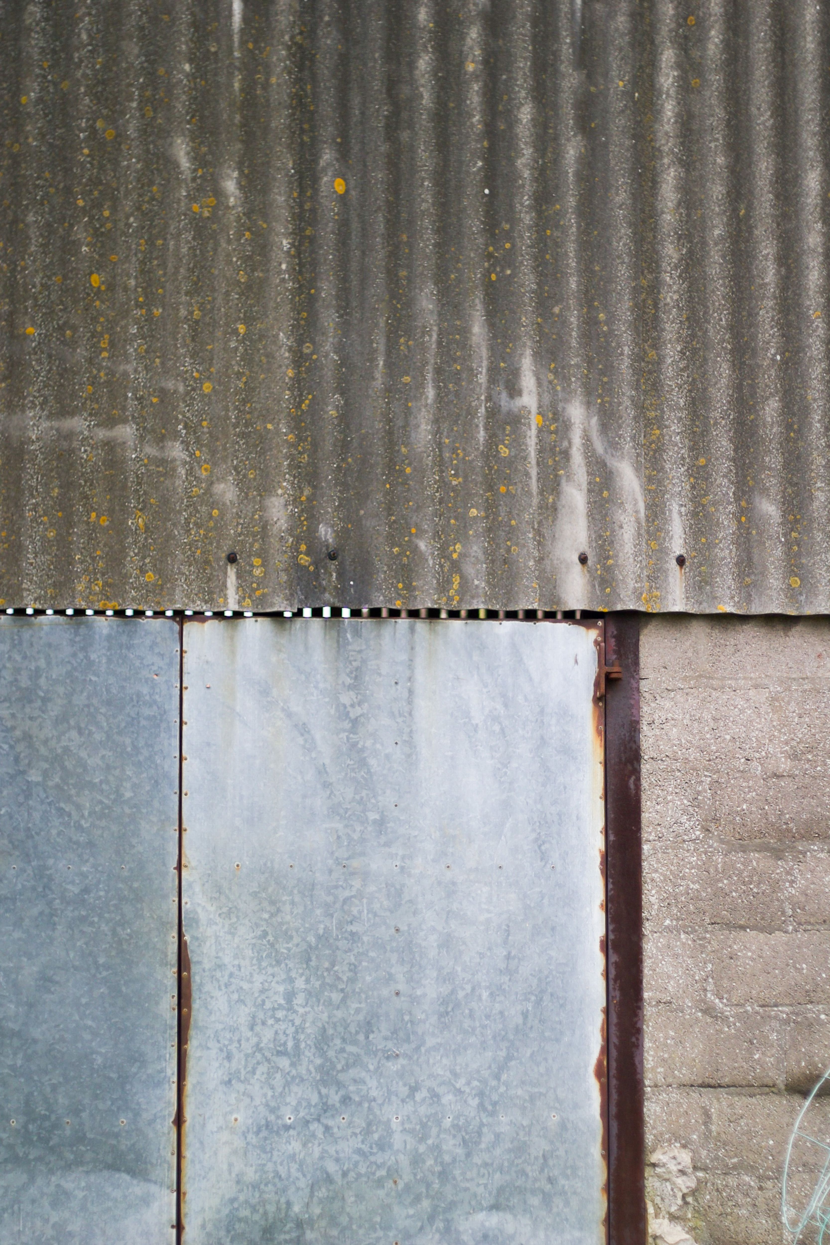 Rustic Corrugated Metal and Concrete Wall in Bristol · Free Stock Photo
