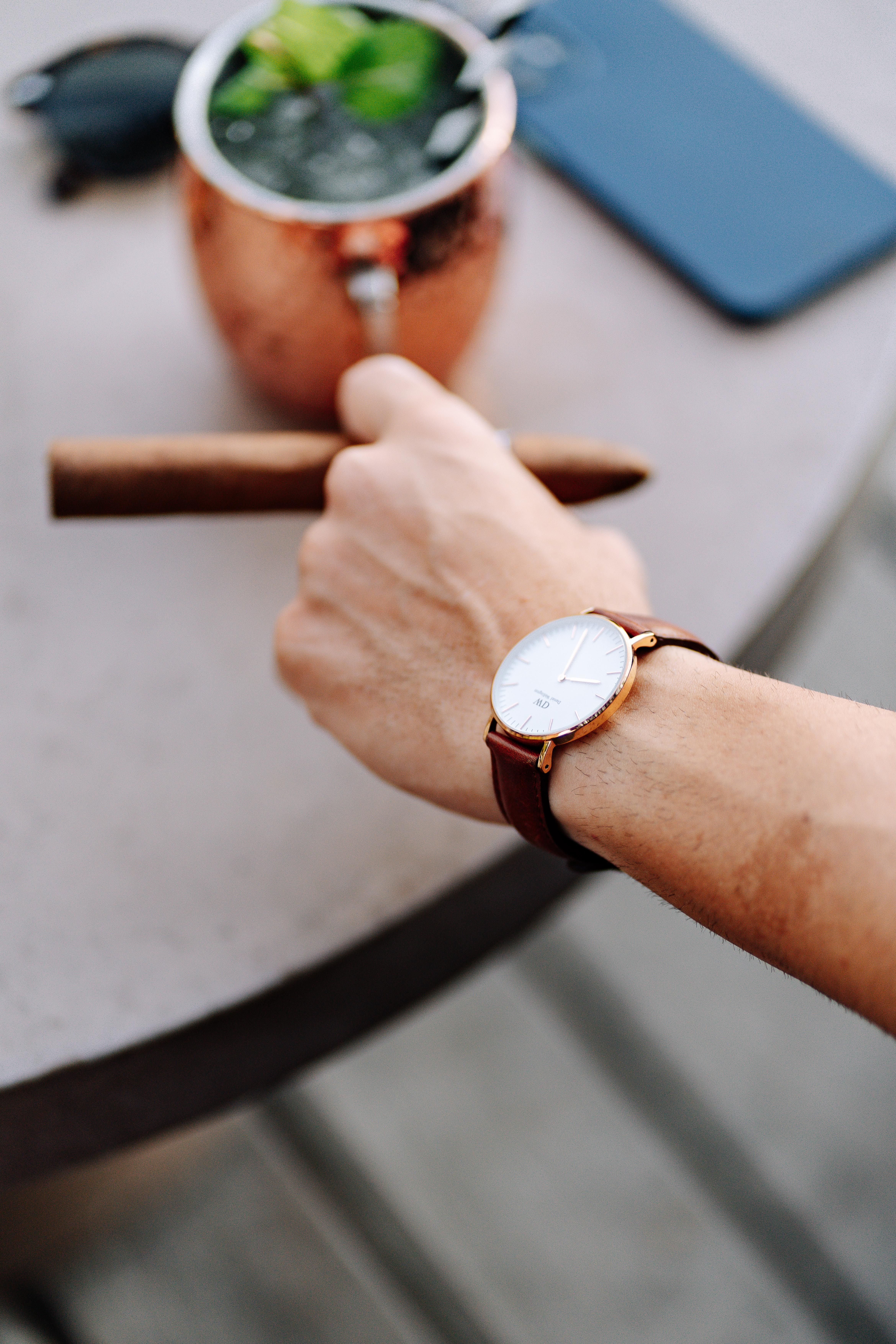 Stylish Watch and Relaxing Drink Setup · Free Stock Photo