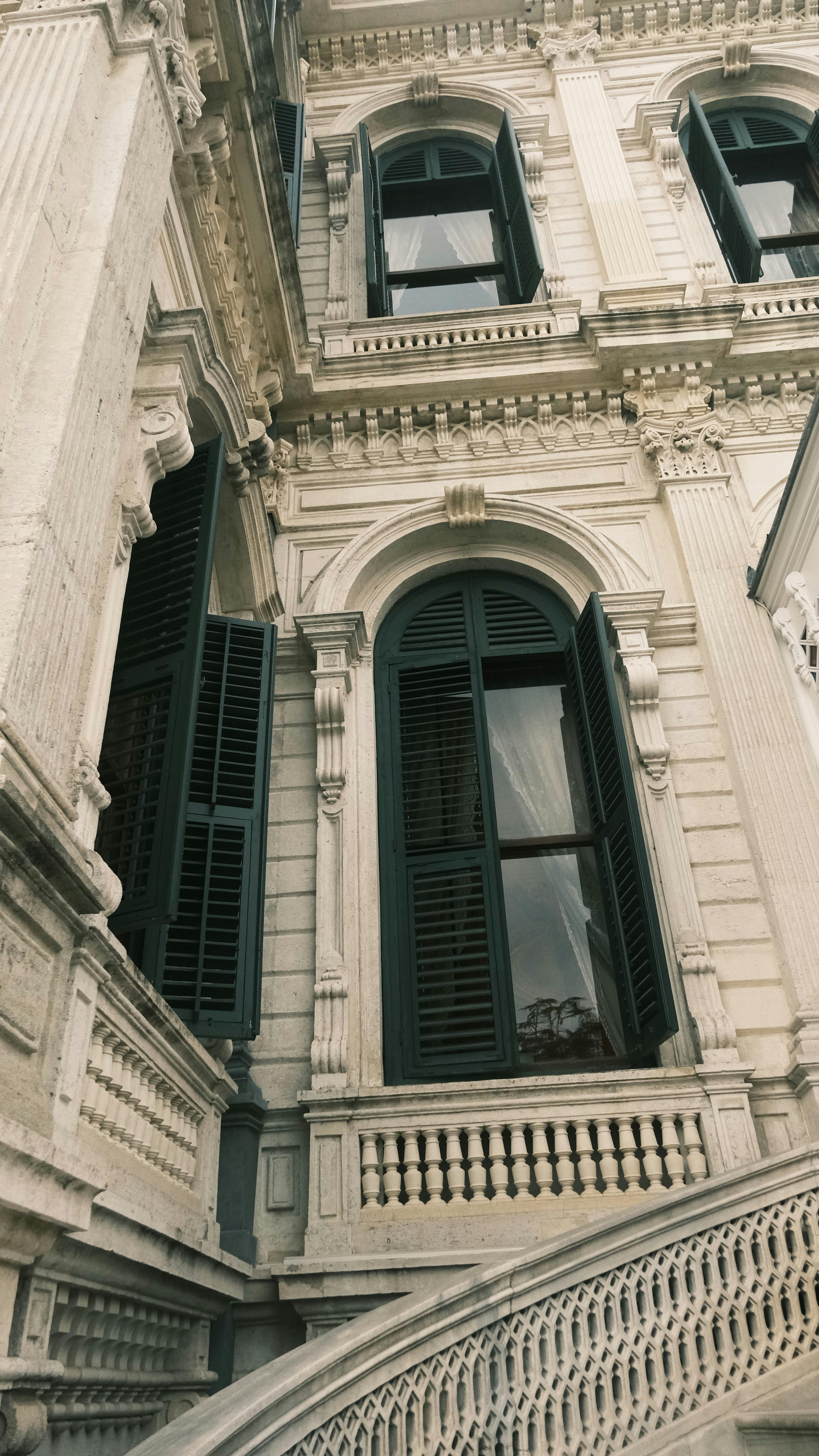 Elegant Historic Building with Arched Windows · Free Stock Photo