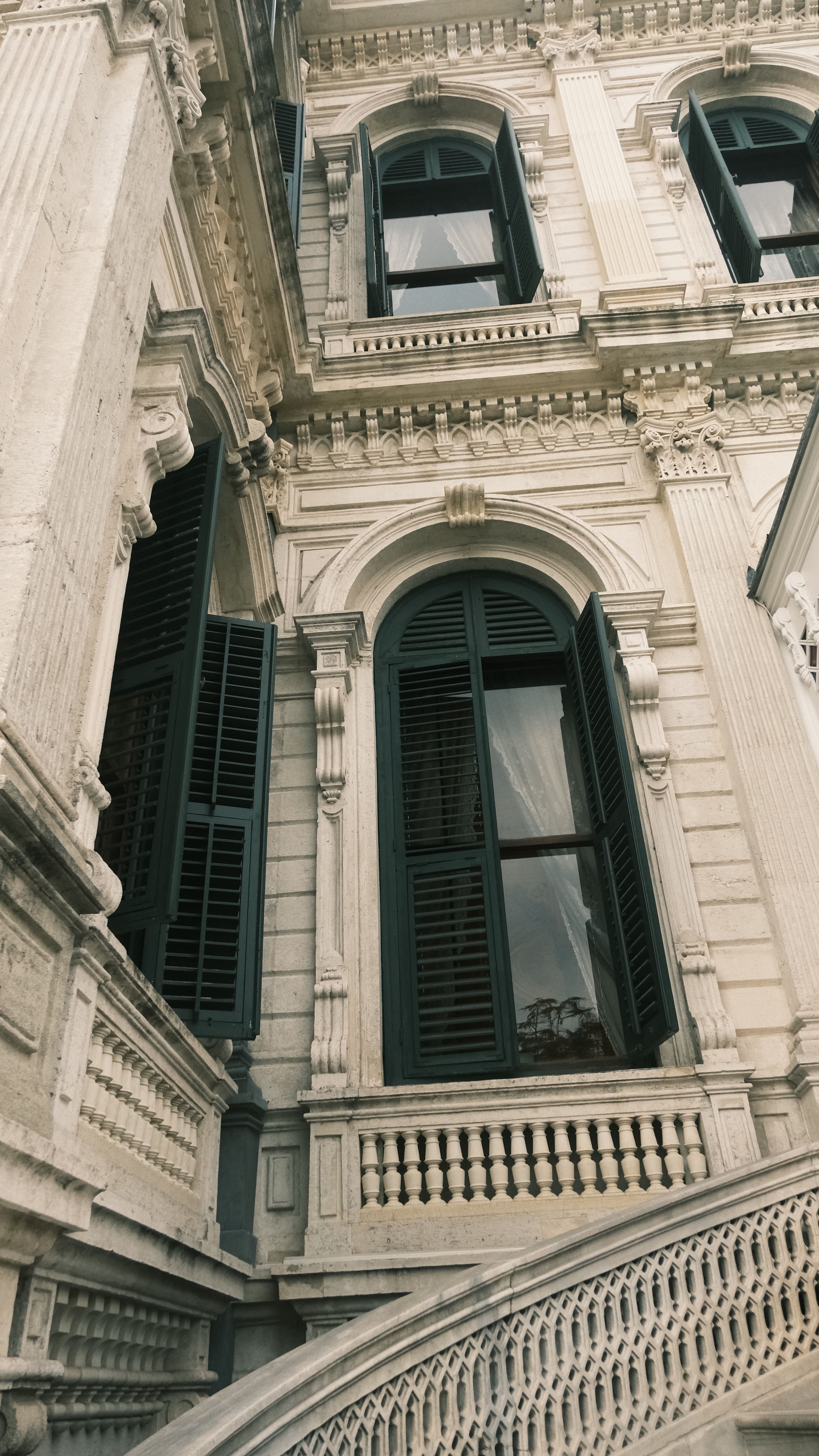 Elegant Historic Building with Arched Windows · Free Stock Photo