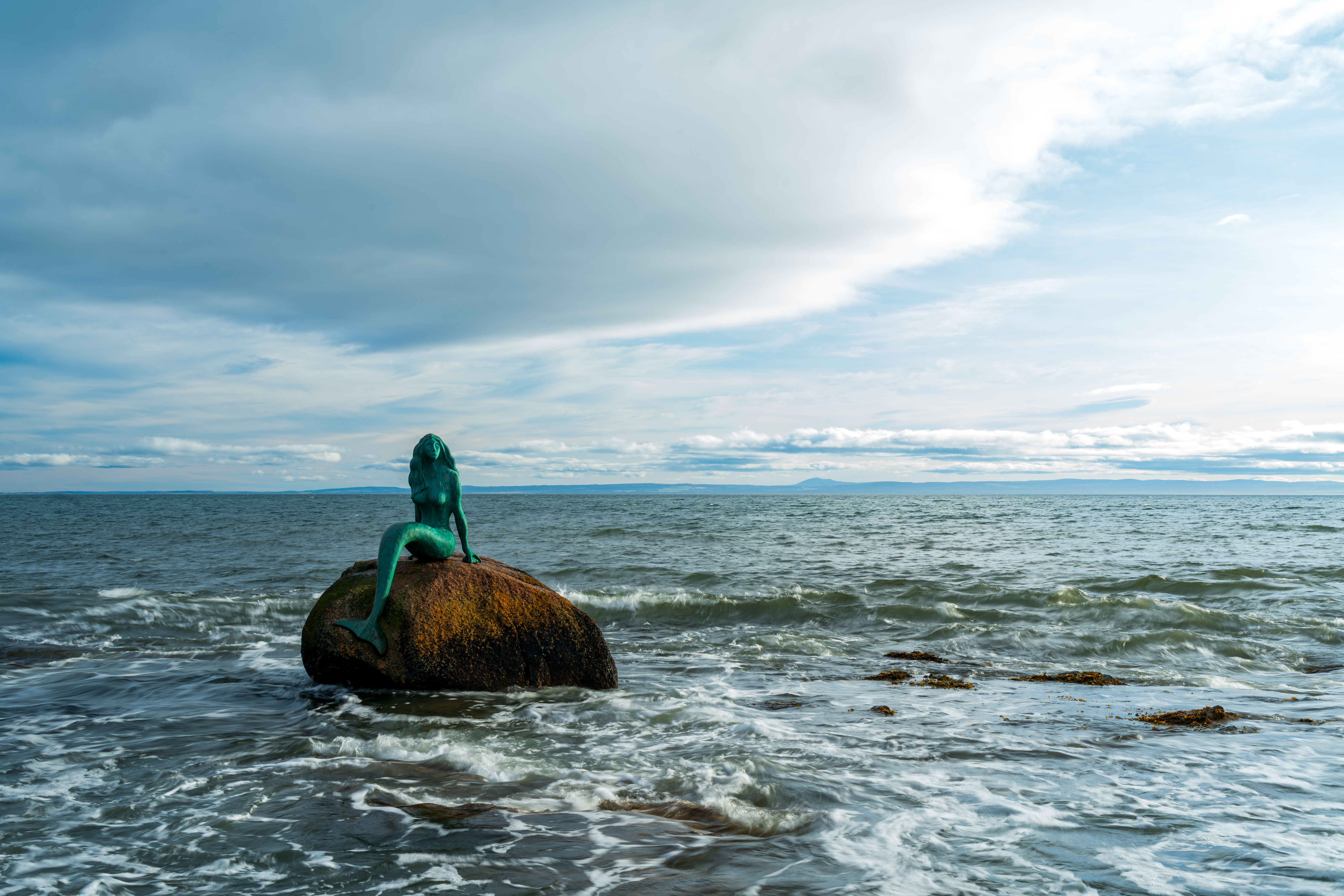 Mermaid Statue on Rock by the Seashore · Free Stock Photo
