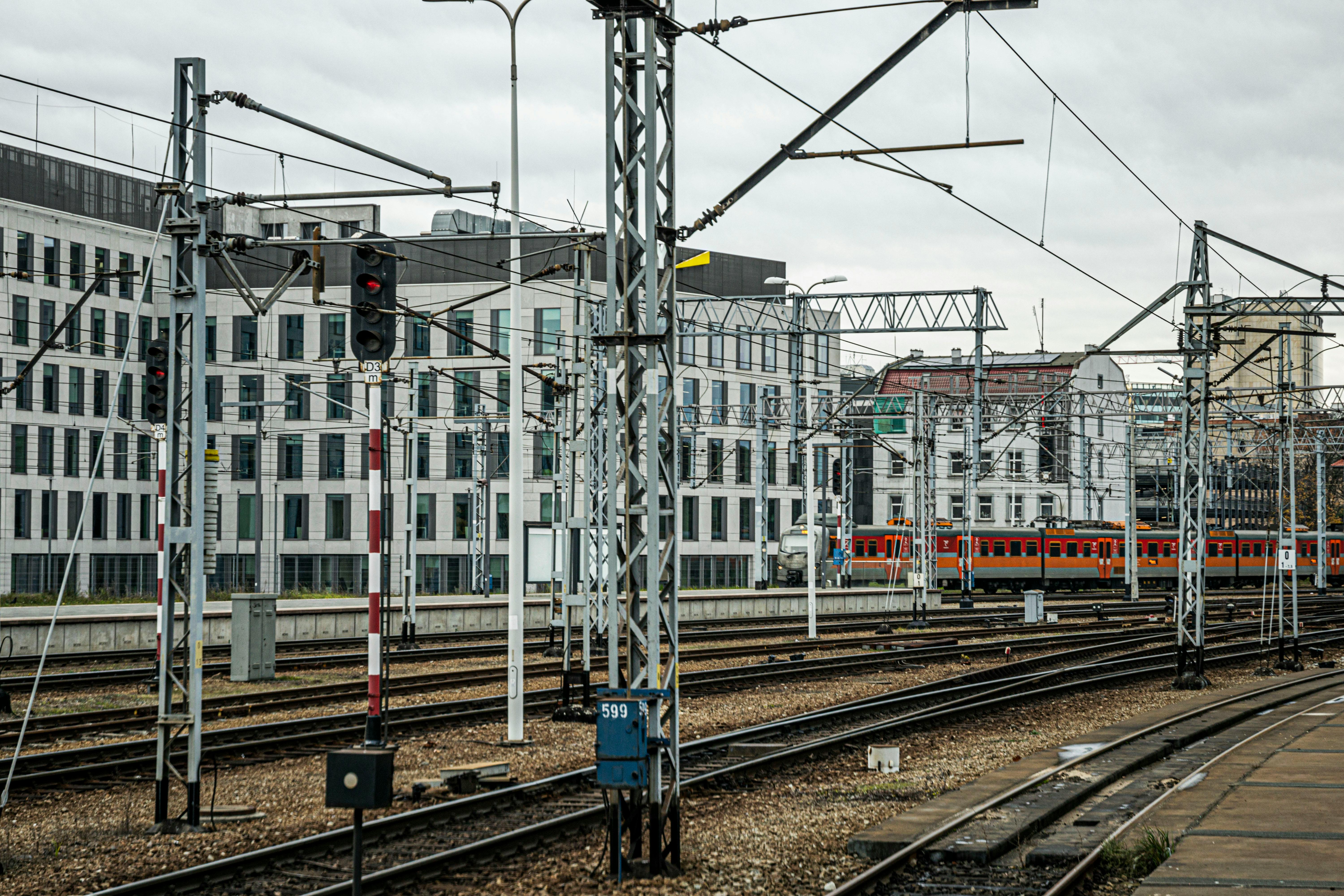 Urban Train Tracks with Modern Buildings · Free Stock Photo