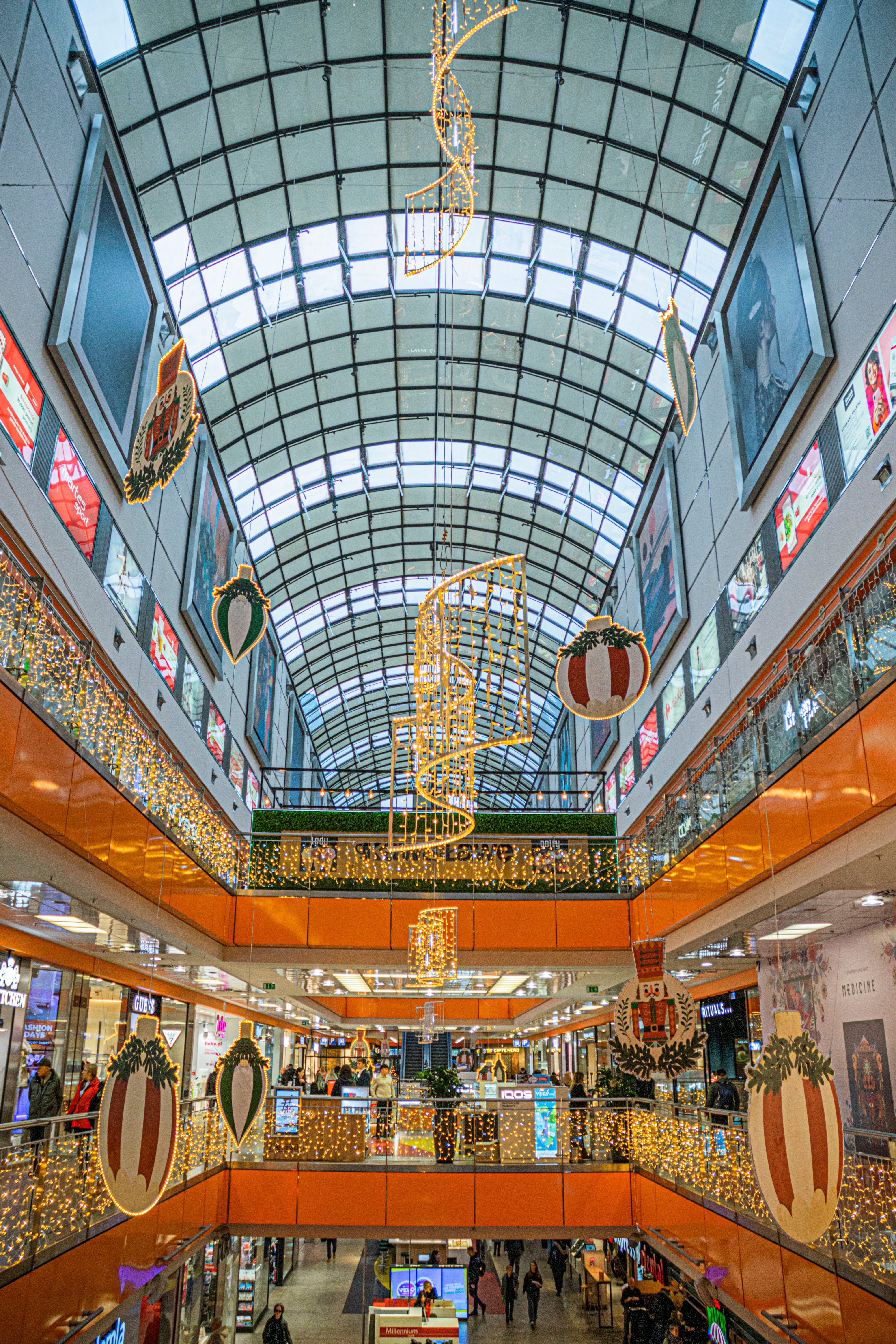 Festive Shopping Mall Decorated for Christmas · Free Stock Photo