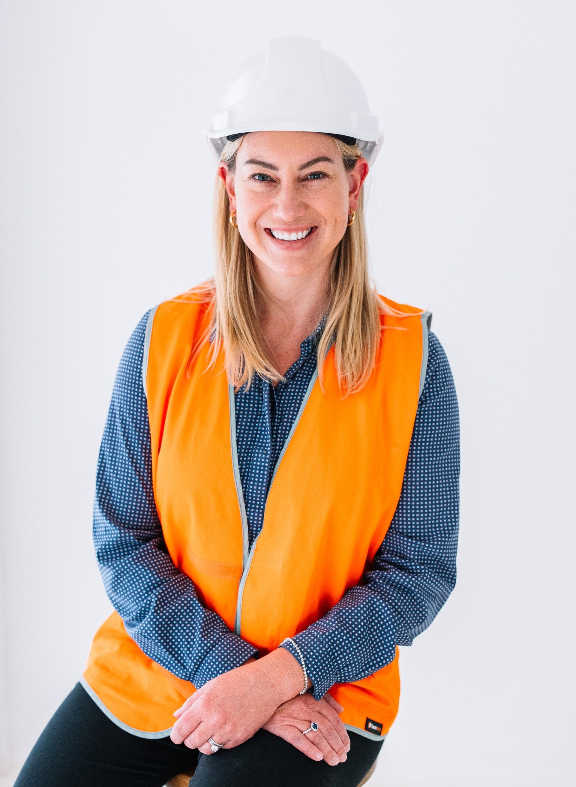 Confident Female Engineer in Safety Vest · Free Stock Photo