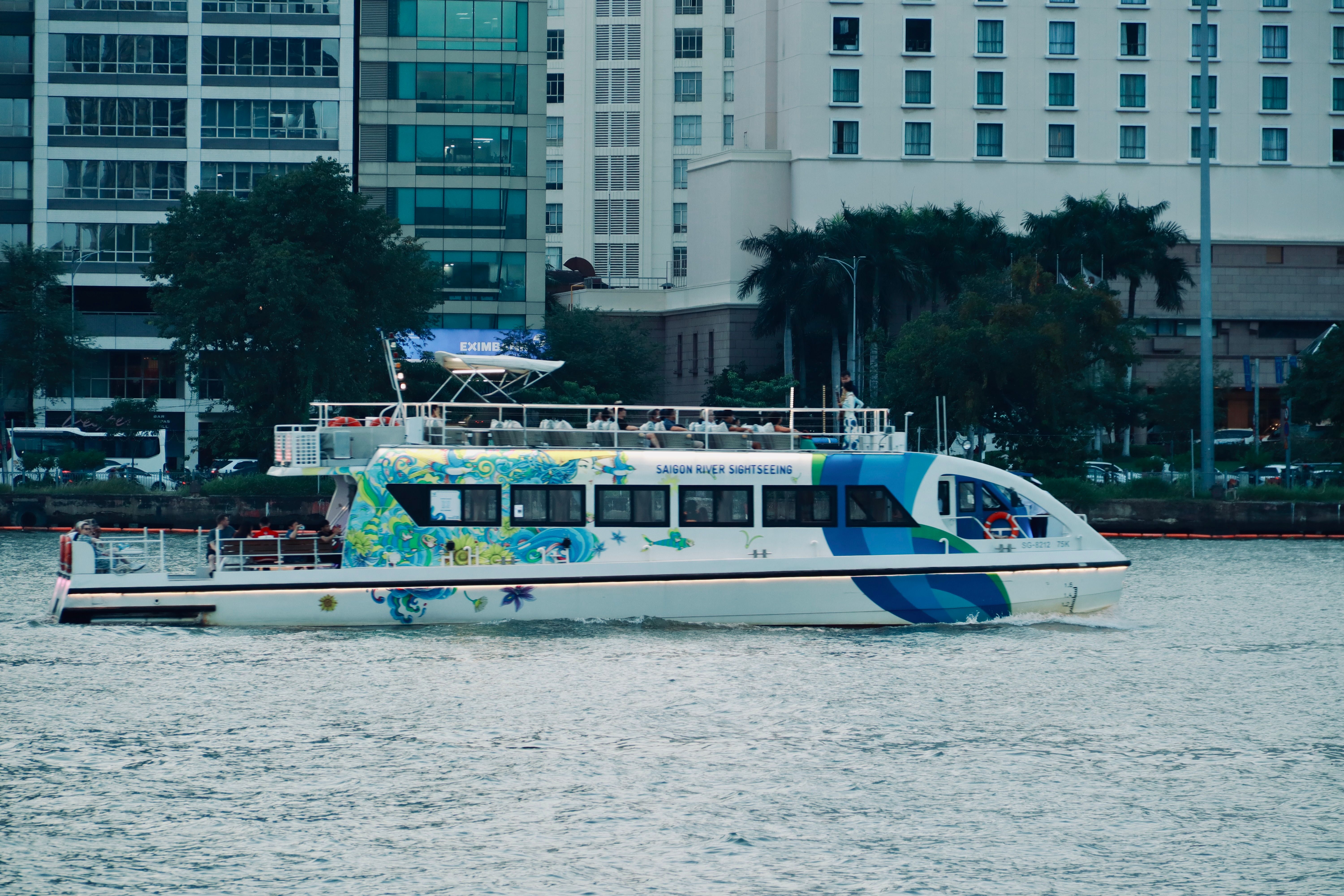 Colorful River Tour Boat on Saigon River · Free Stock Photo