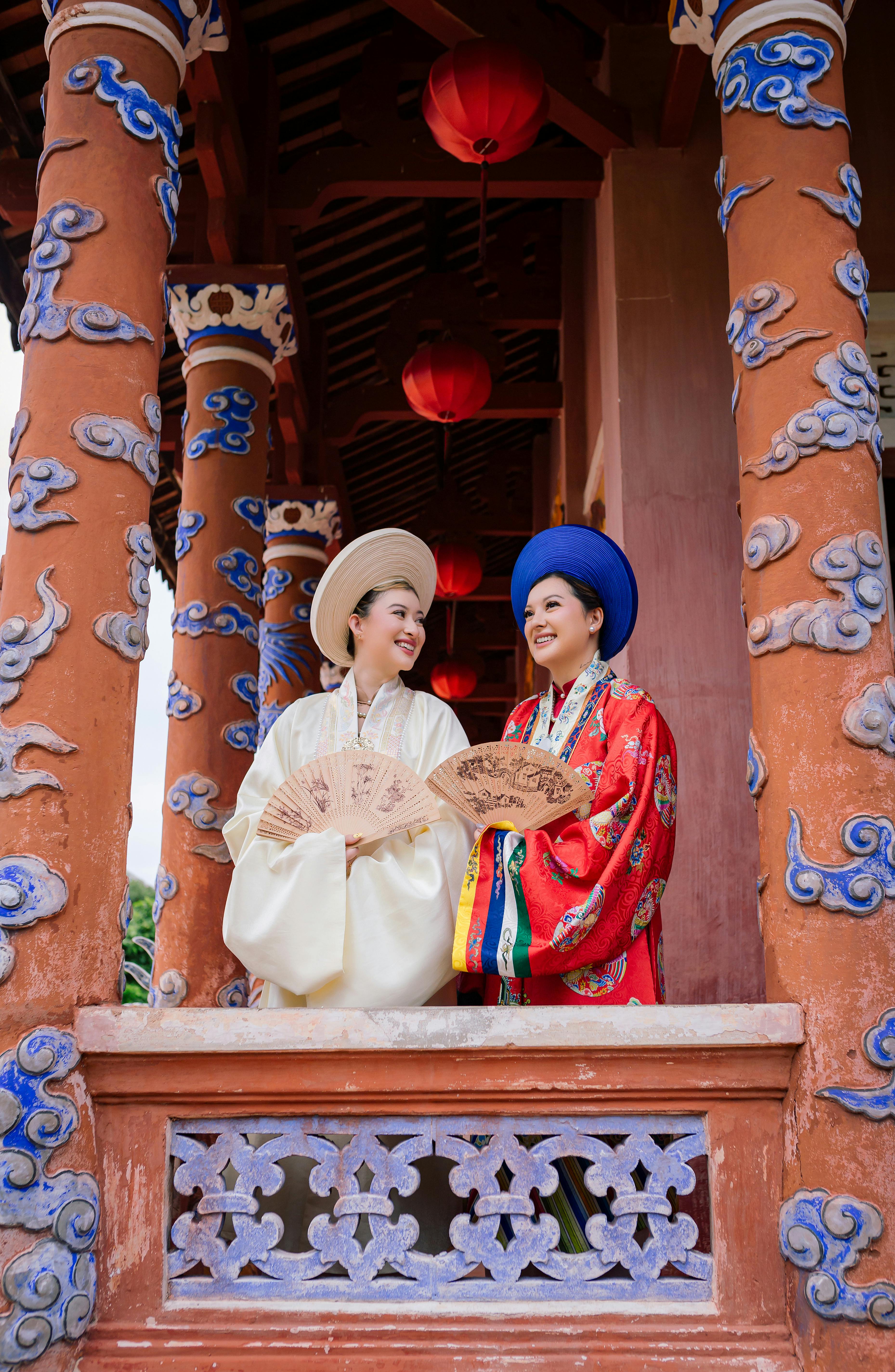 Traditional Asian Attire at Cultural Temple · Free Stock Photo