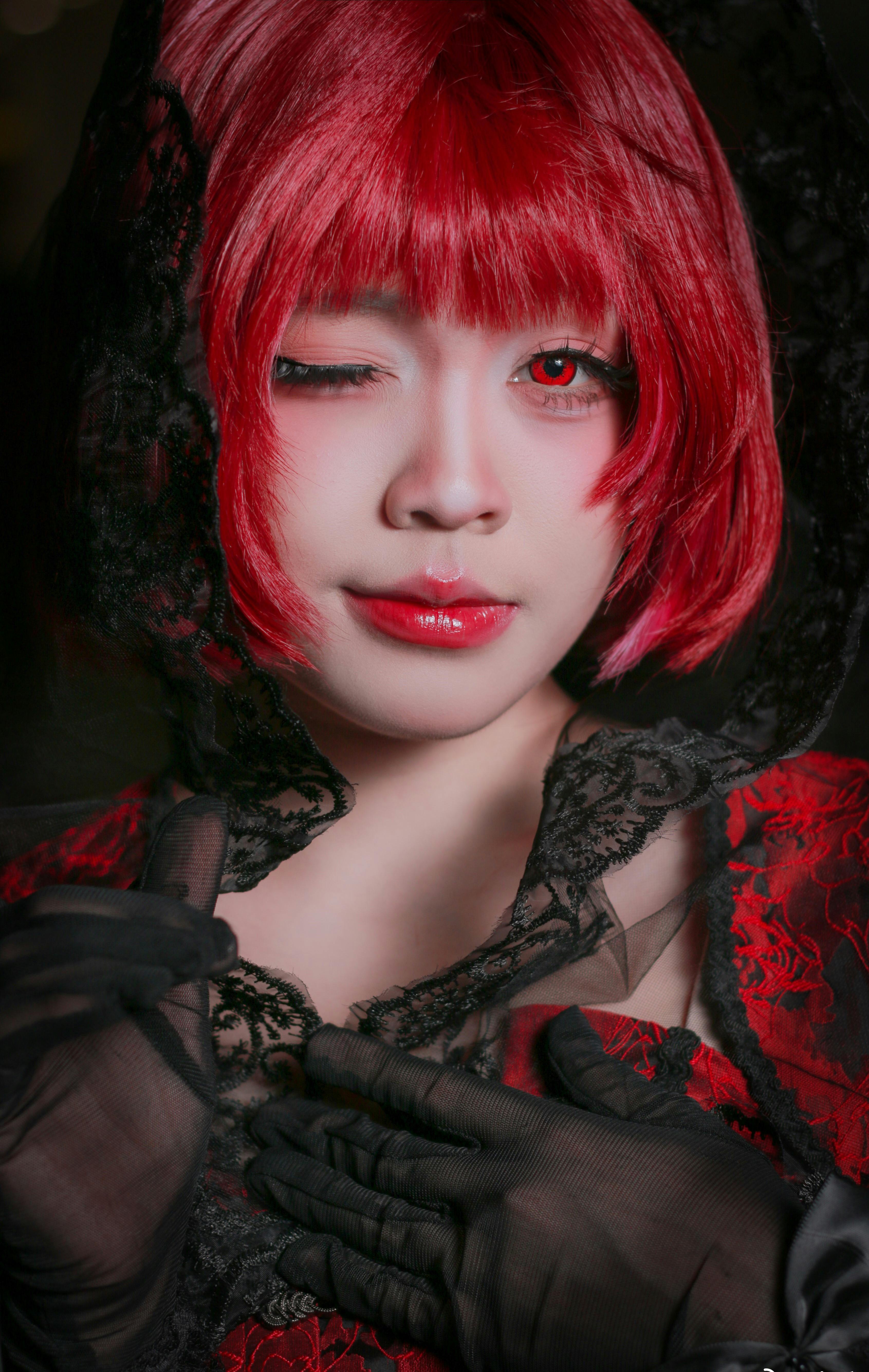 Captivating Red-Haired Cosplay Portrait · Free Stock Photo