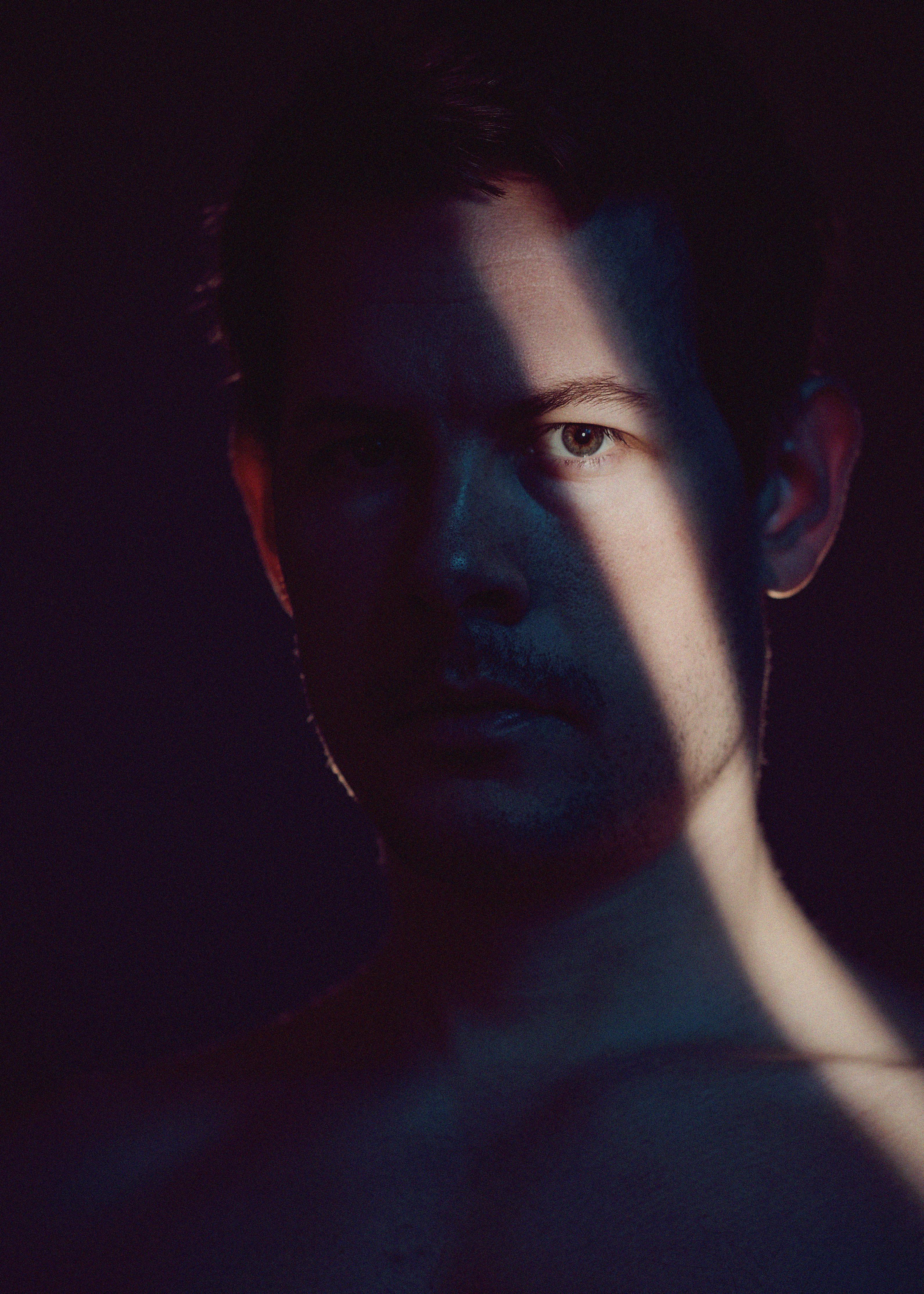 Moody Male Portrait with Dramatic Lighting · Free Stock Photo