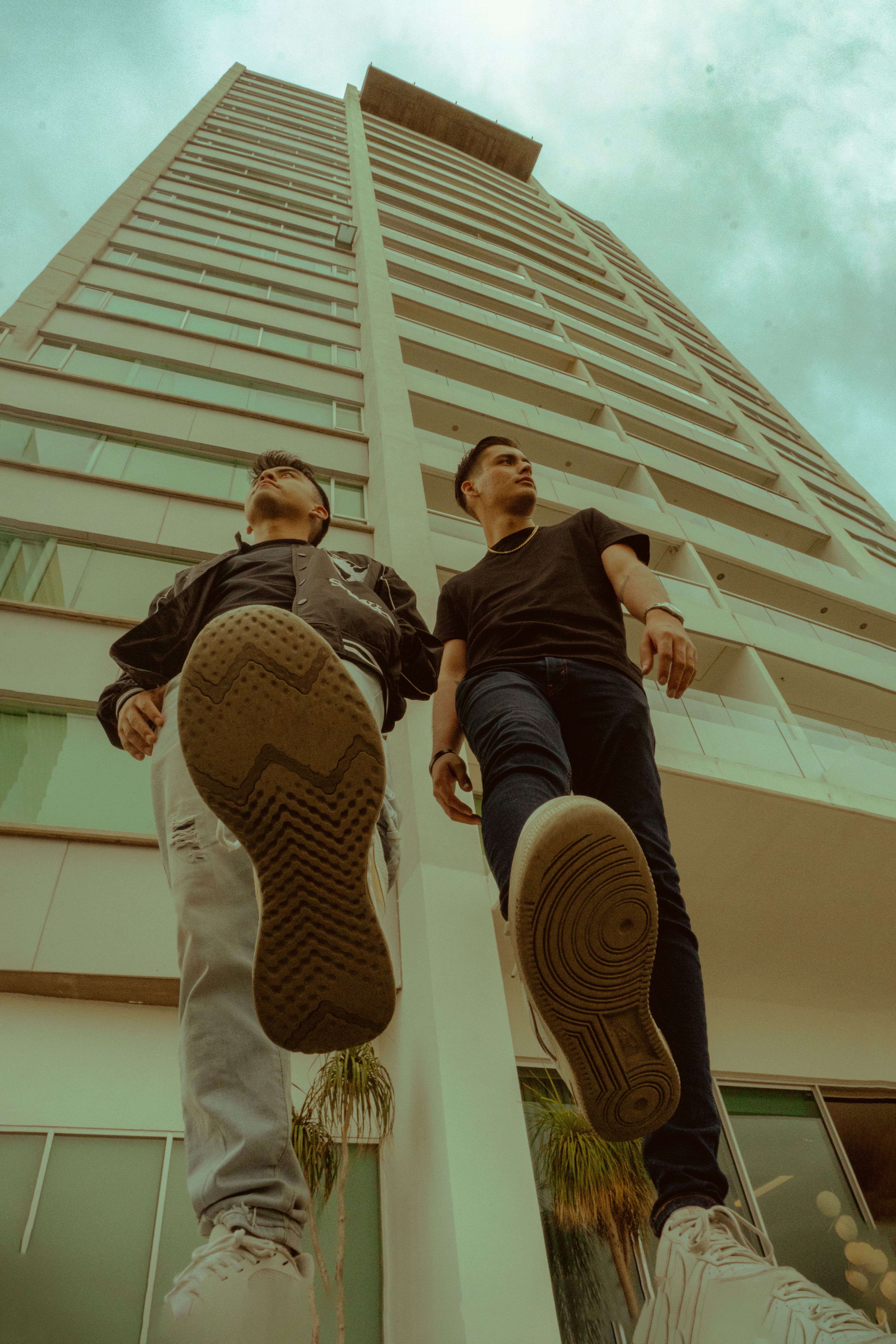 Dynamic Urban Perspective of Two Young Men · Free Stock Photo