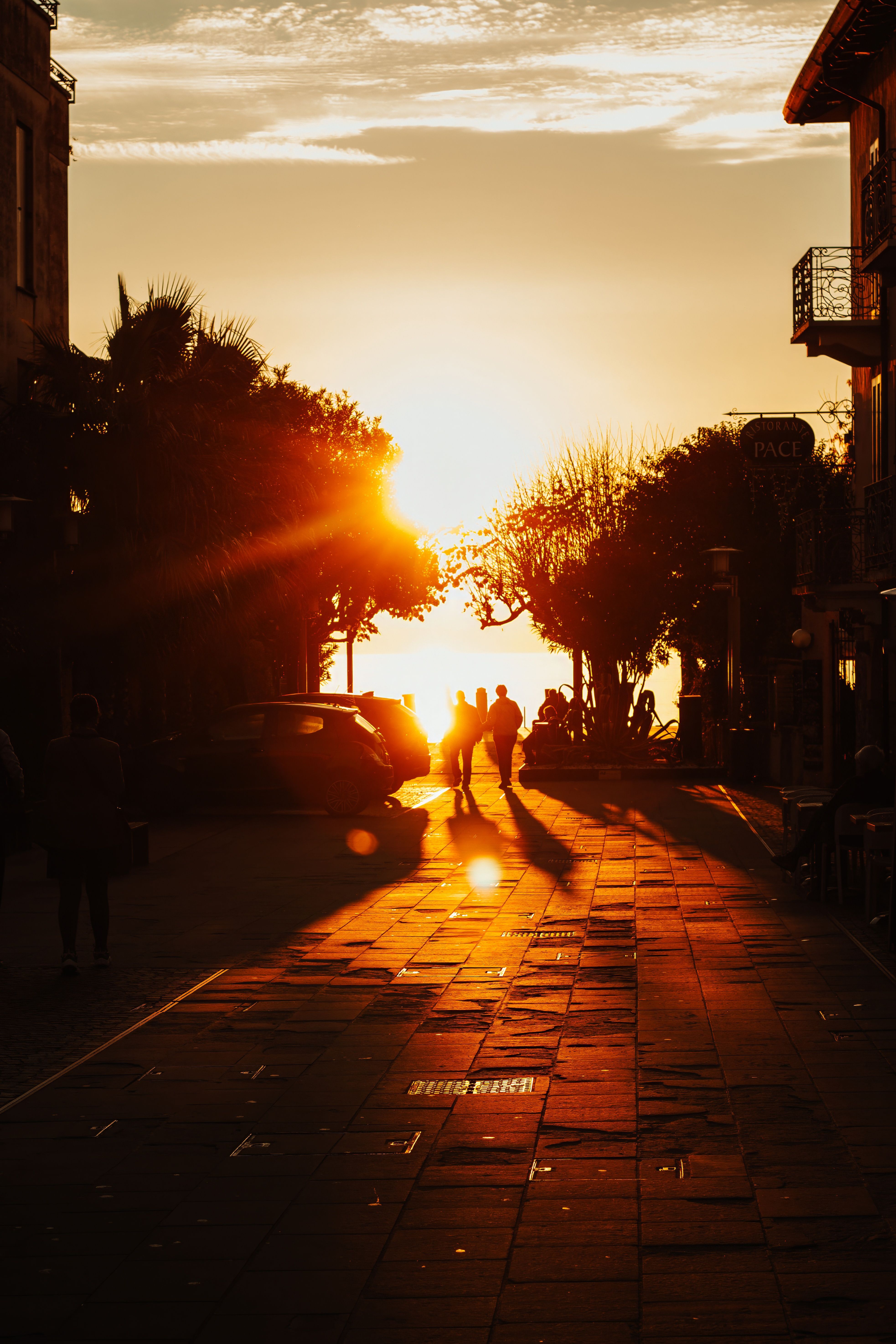 Sunset Stroll in a Charming City Street · Free Stock Photo