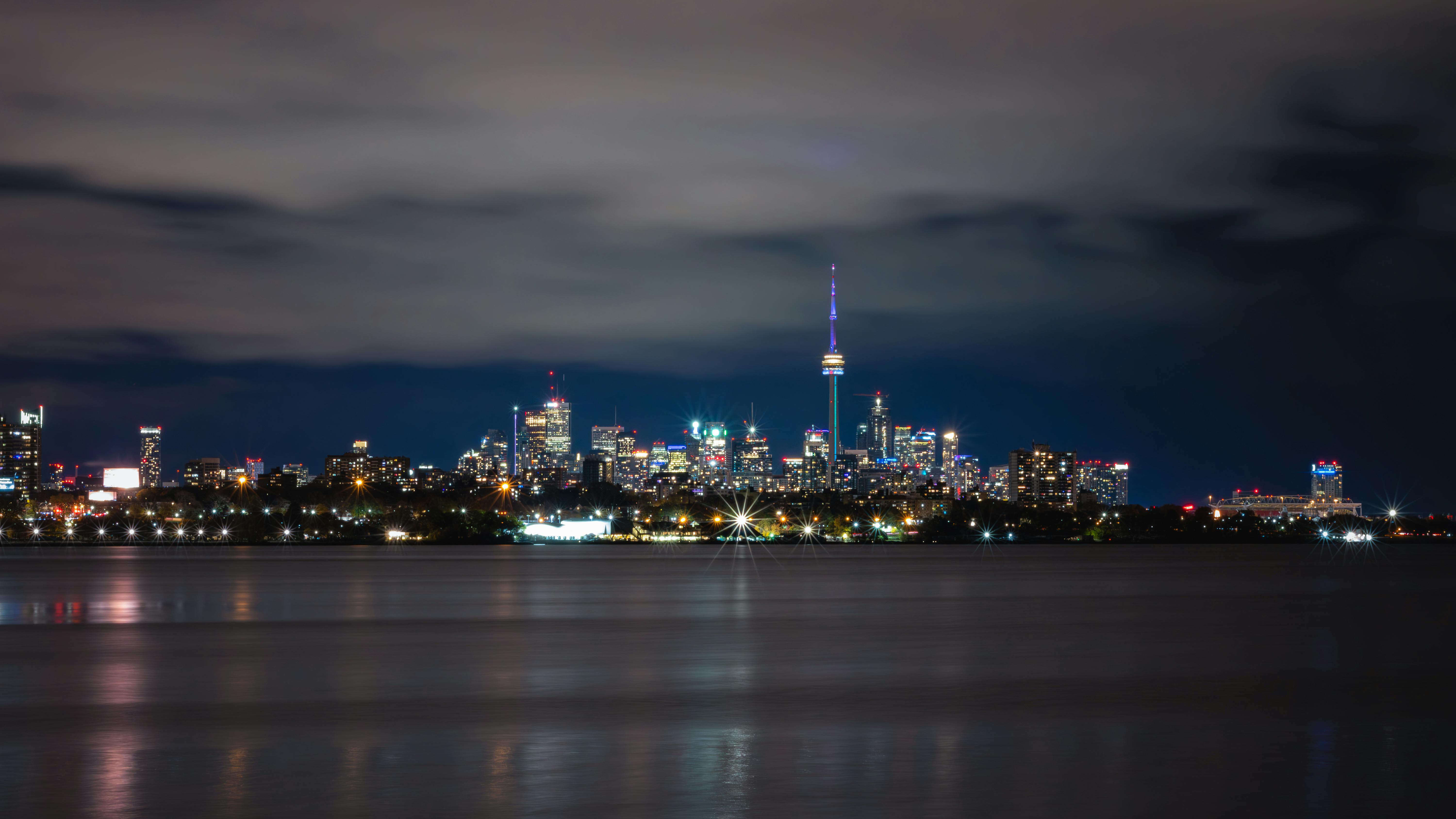 Toronto Skyline at Night Featuring CN Tower · Free Stock Photo