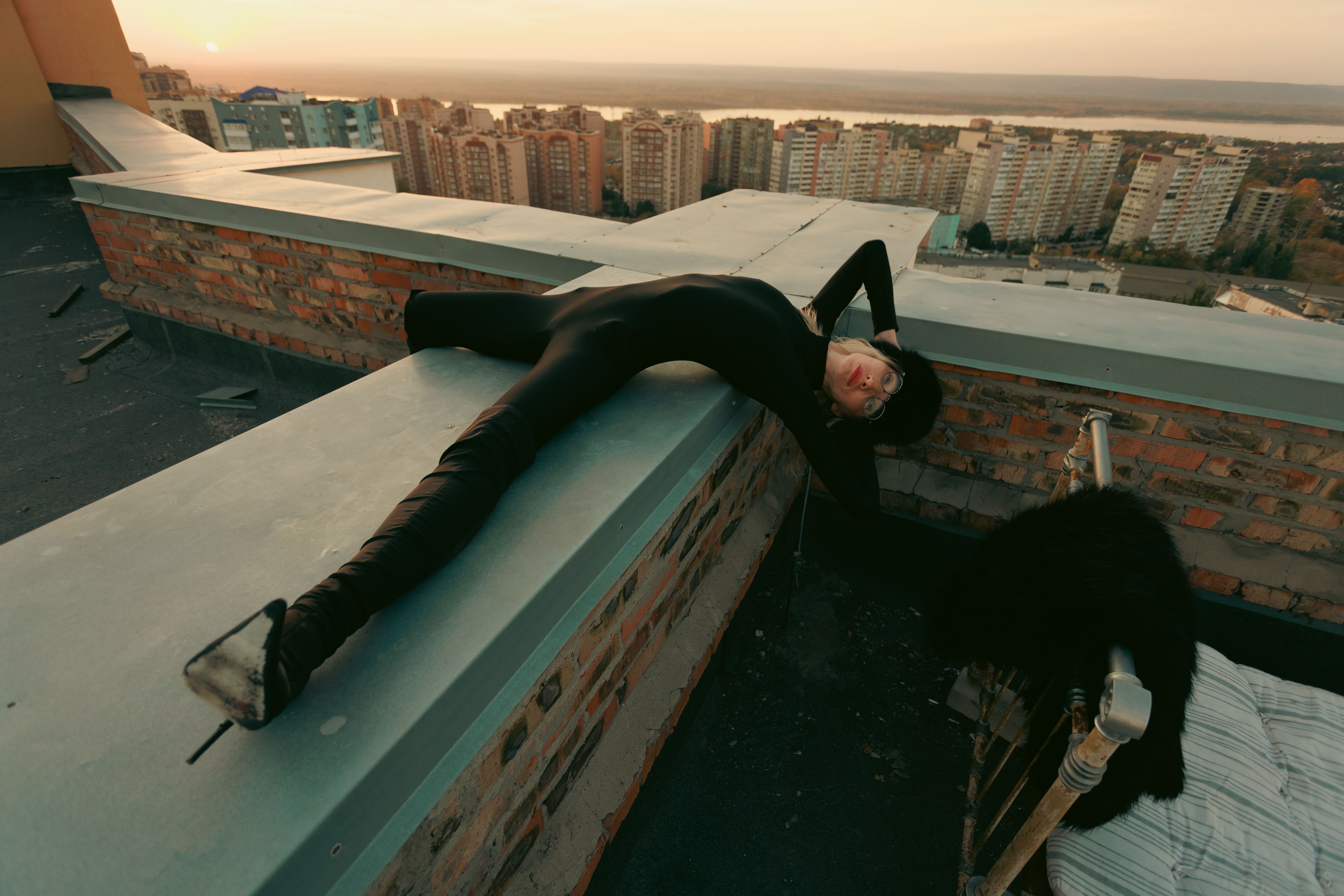 Urban Rooftop Fashion Pose at Sunset · Free Stock Photo