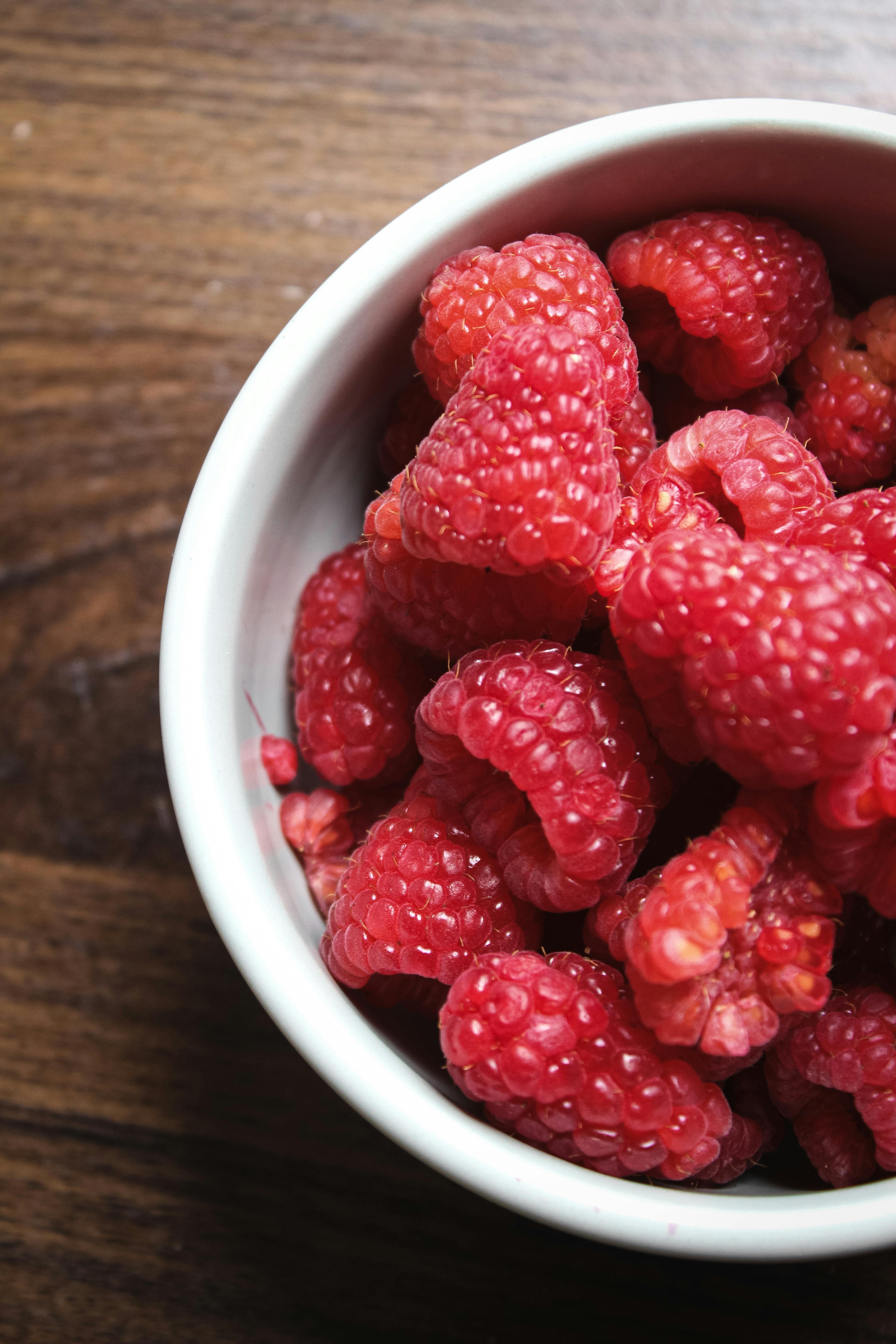 Fresh Ripe Raspberries in White Bowl · Free Stock Photo