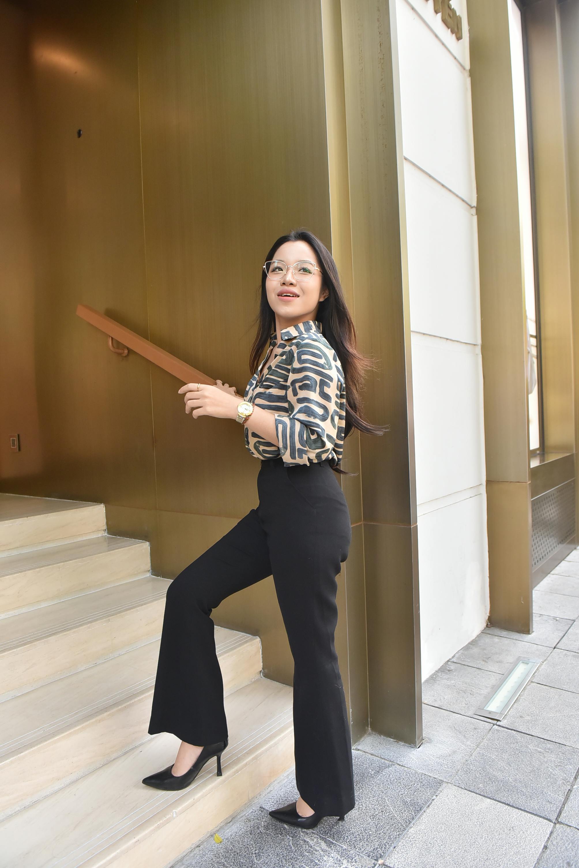 Professional Woman Climbing Stairs Outdoors · Free Stock Photo