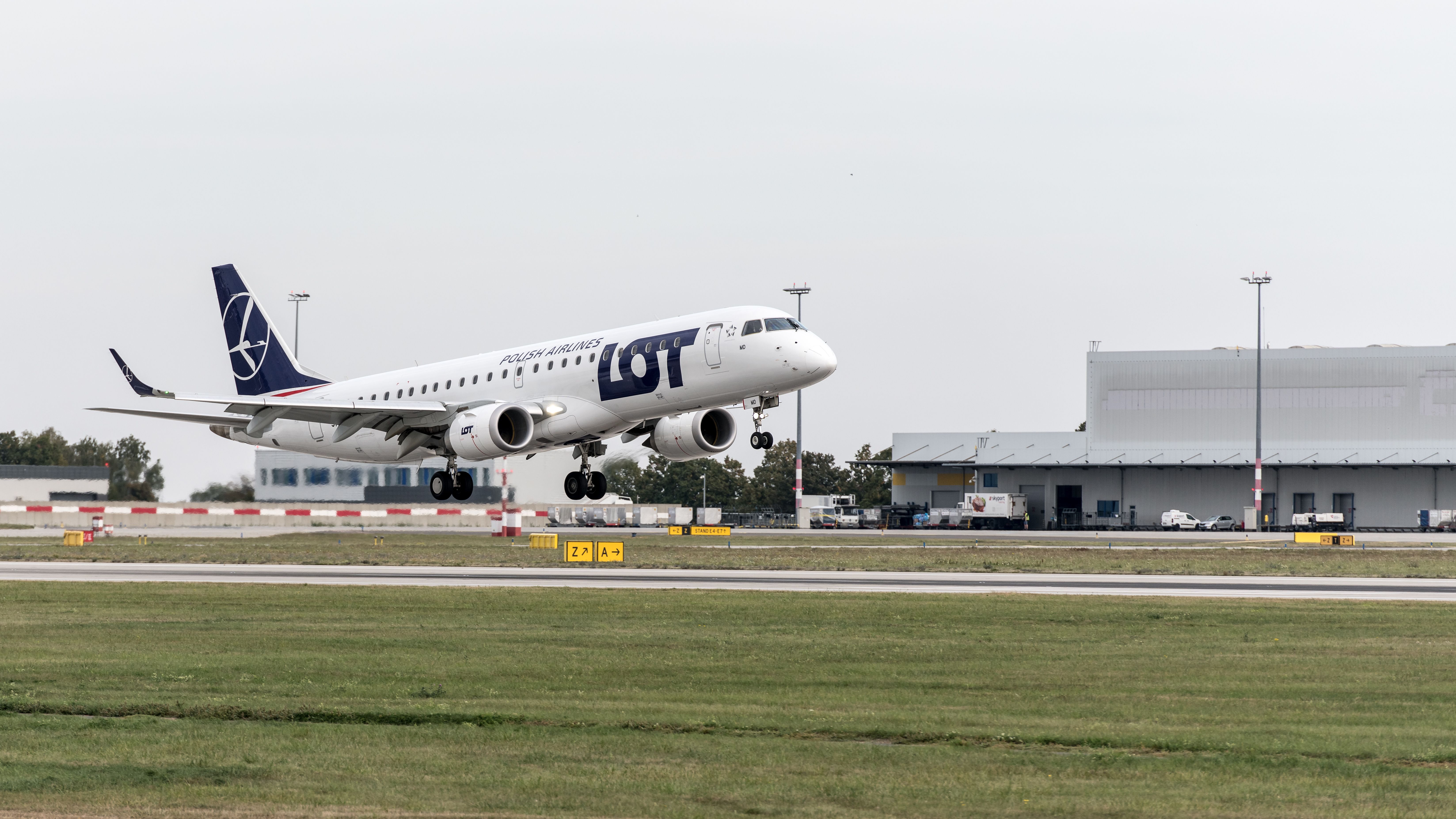 Passenger Airplane Taking Off at Airport Terminal · Free Stock Photo