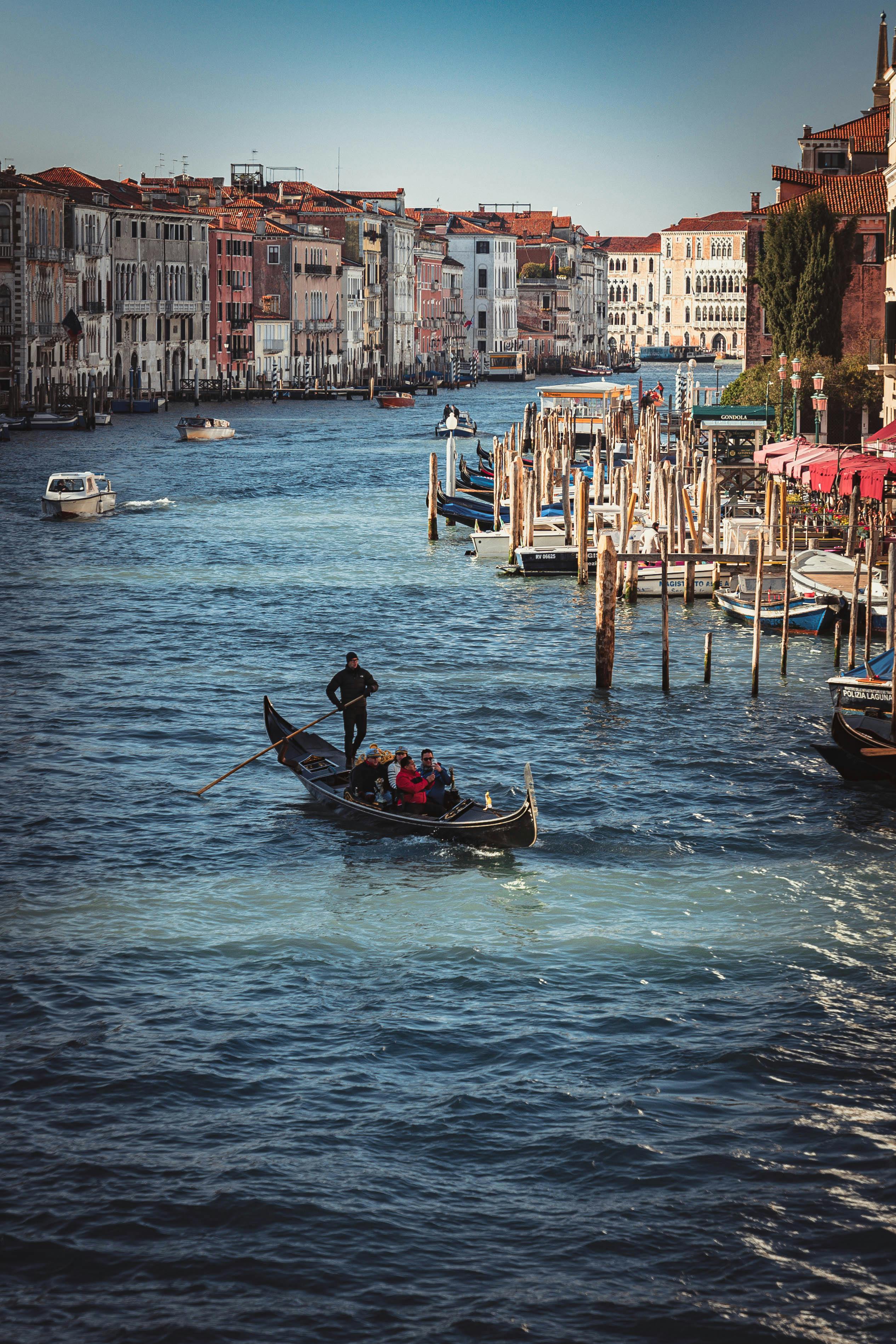 Scenic Gondola Ride Through Venice's Grand Canal · Free Stock Photo