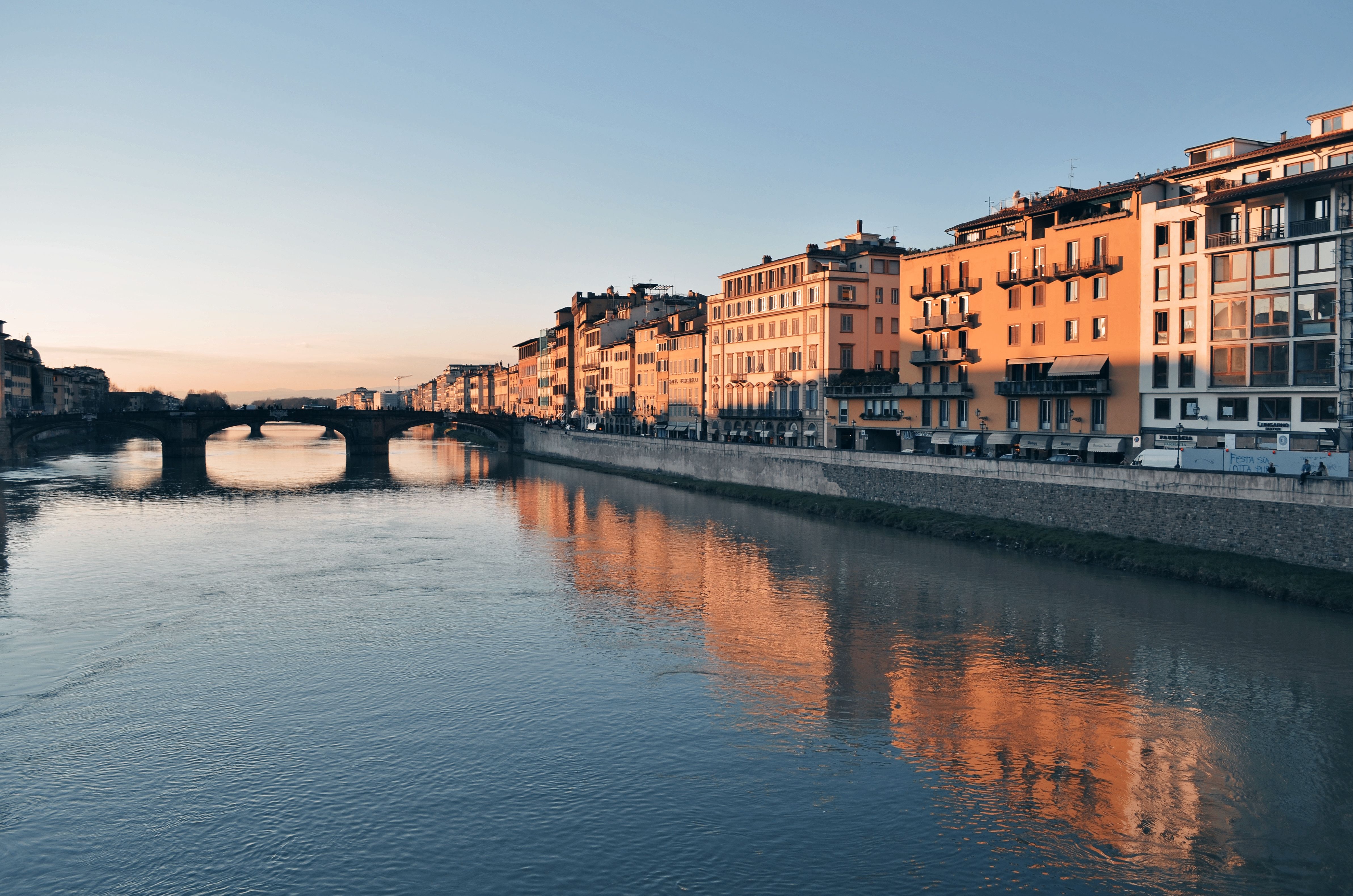Sunset Reflection on Arno River in Florence · Free Stock Photo