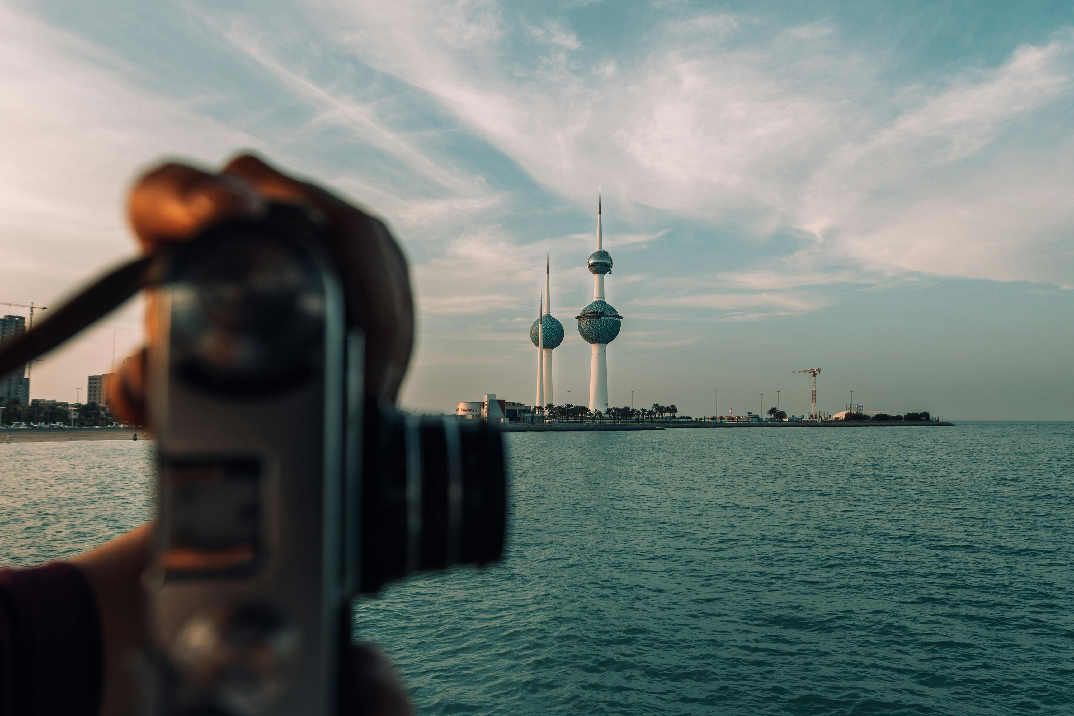 Capturing Kuwait Towers with Vintage Camera · Free Stock Photo