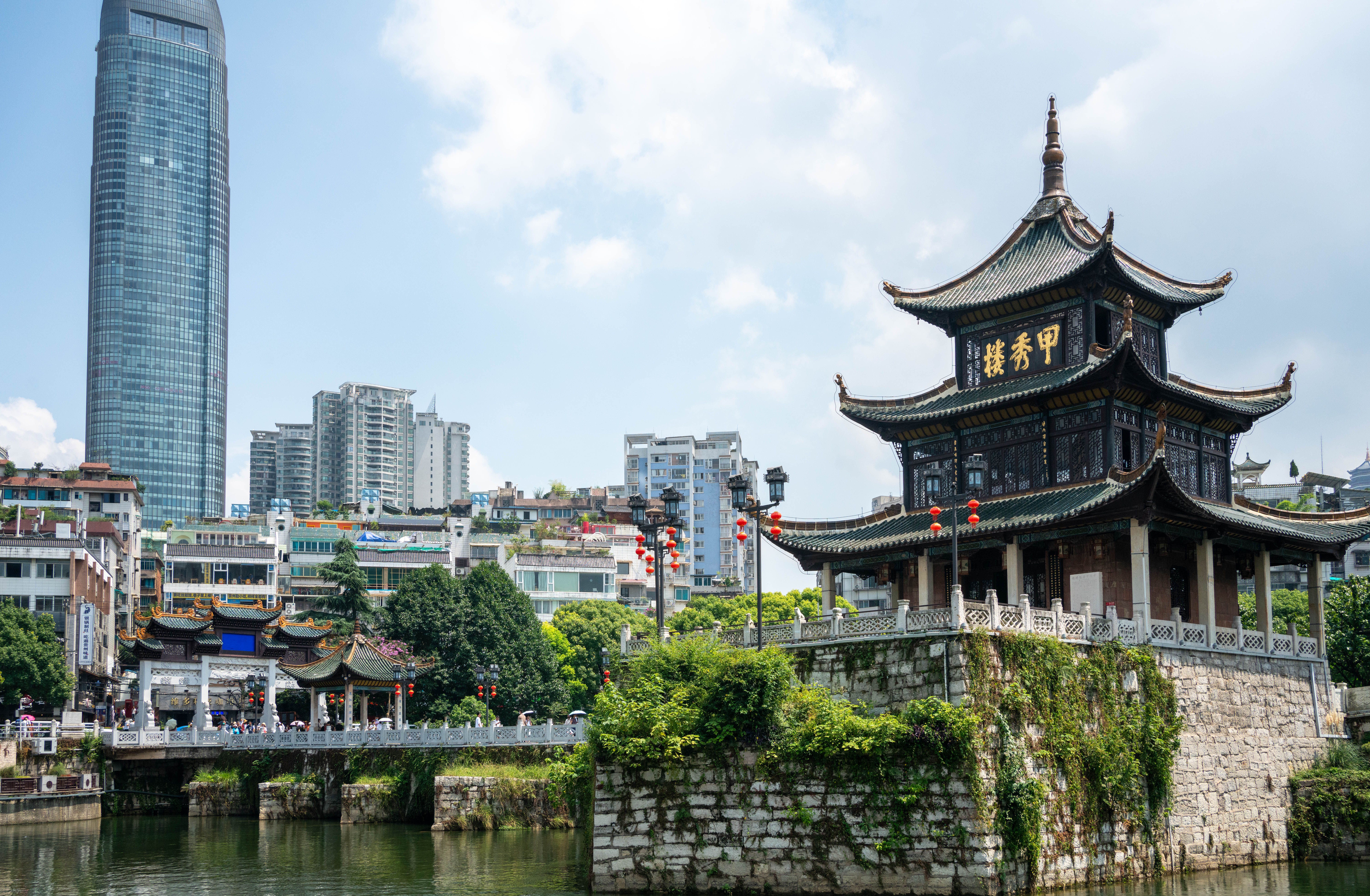 Ancient Pavilion and Modern Skyscraper Contrast · Free Stock Photo