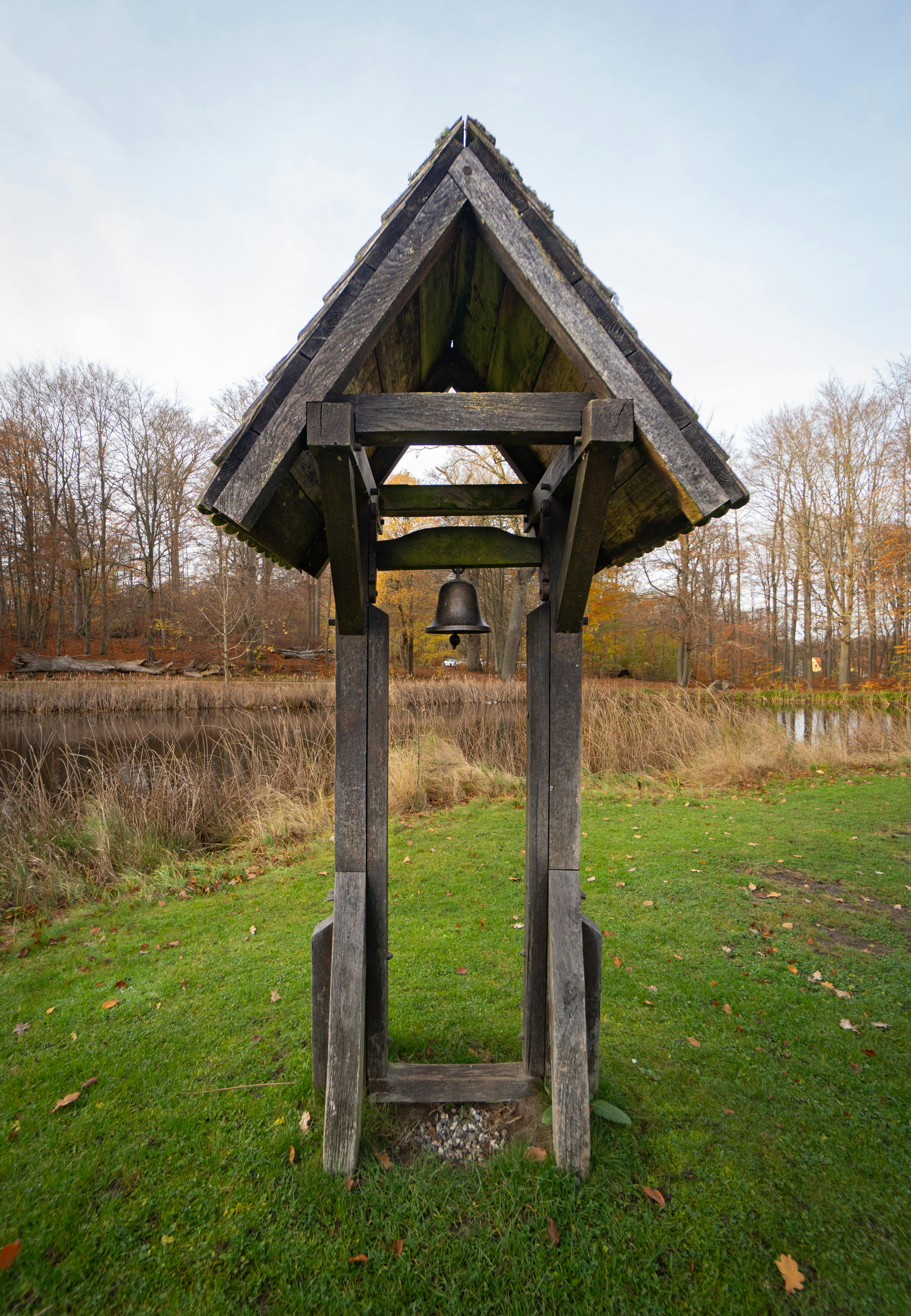 Rustic Bell Structure in Hellebæk Park · Free Stock Photo
