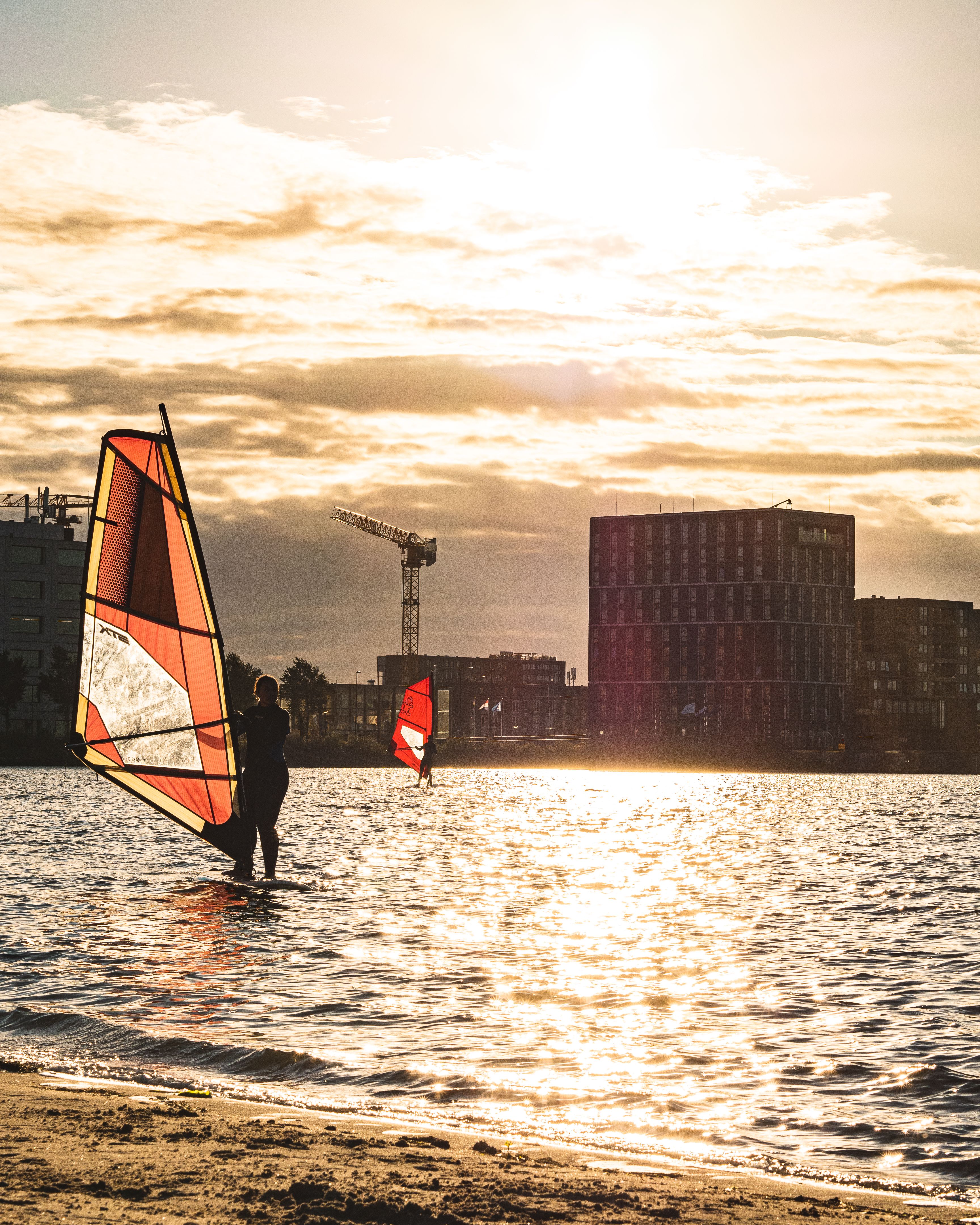 Wind Surfing at Sunset in Amsterdam Harbor · Free Stock Photo
