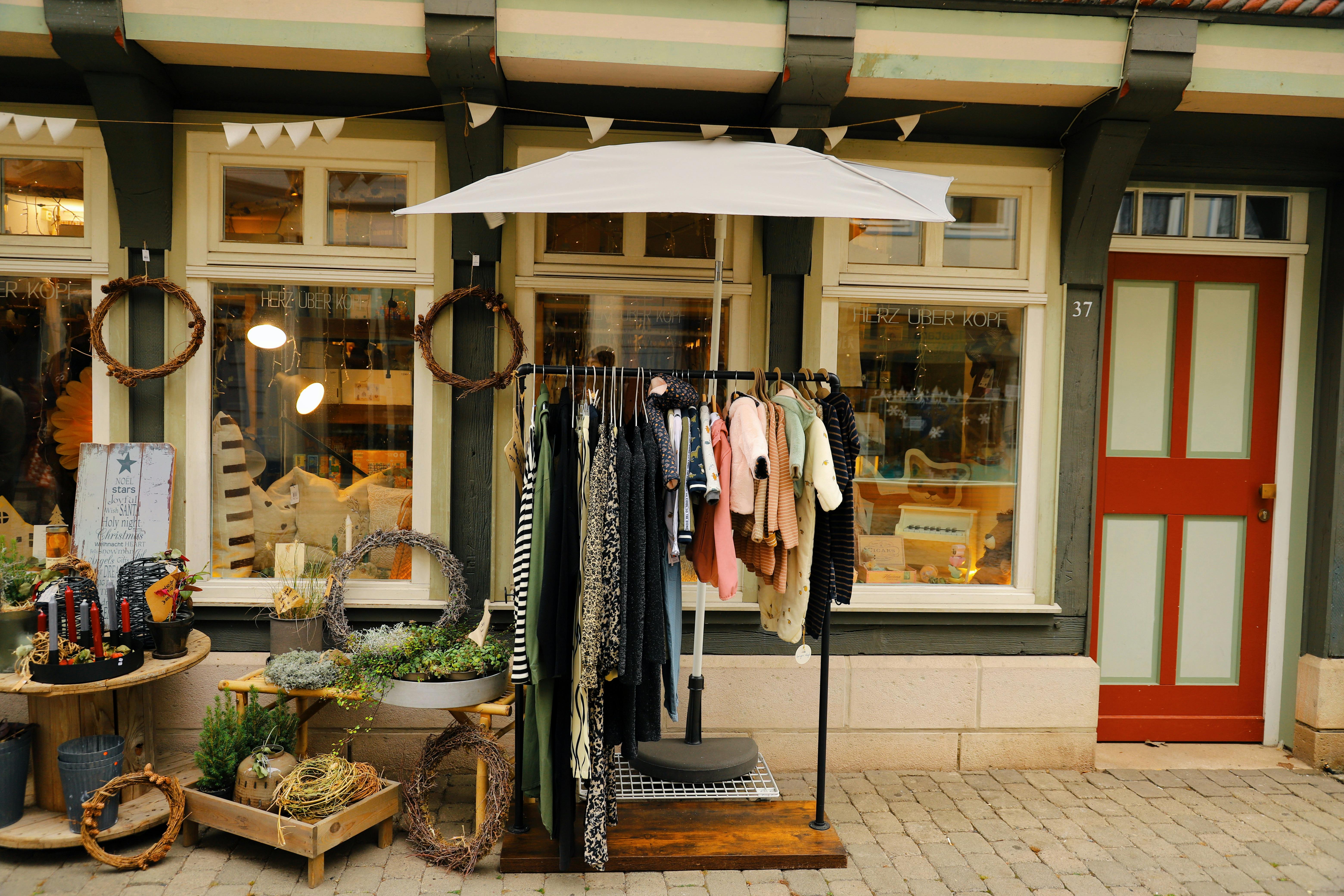 Charming Storefront with Clothing Display in Hann. Münden · Free Stock ...