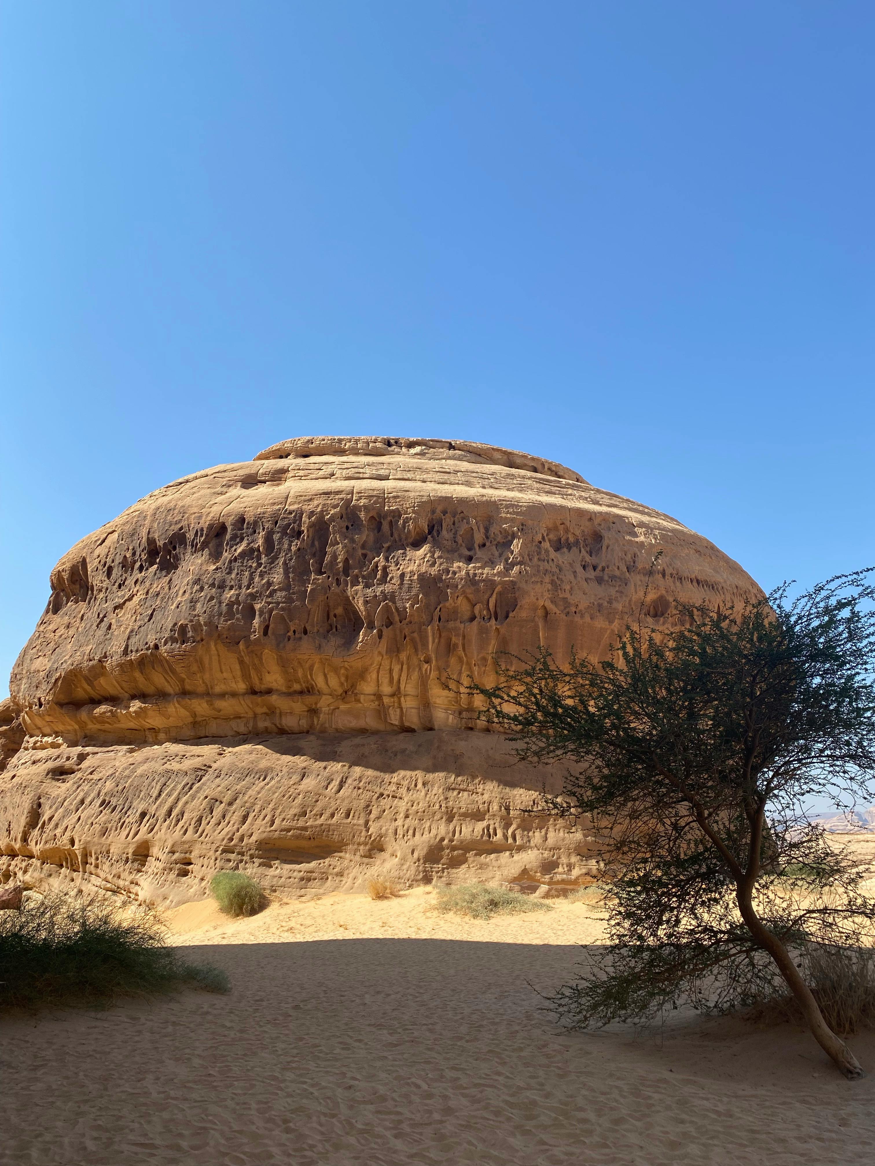Massive Rock Formation in Desert Landscape · Free Stock Photo