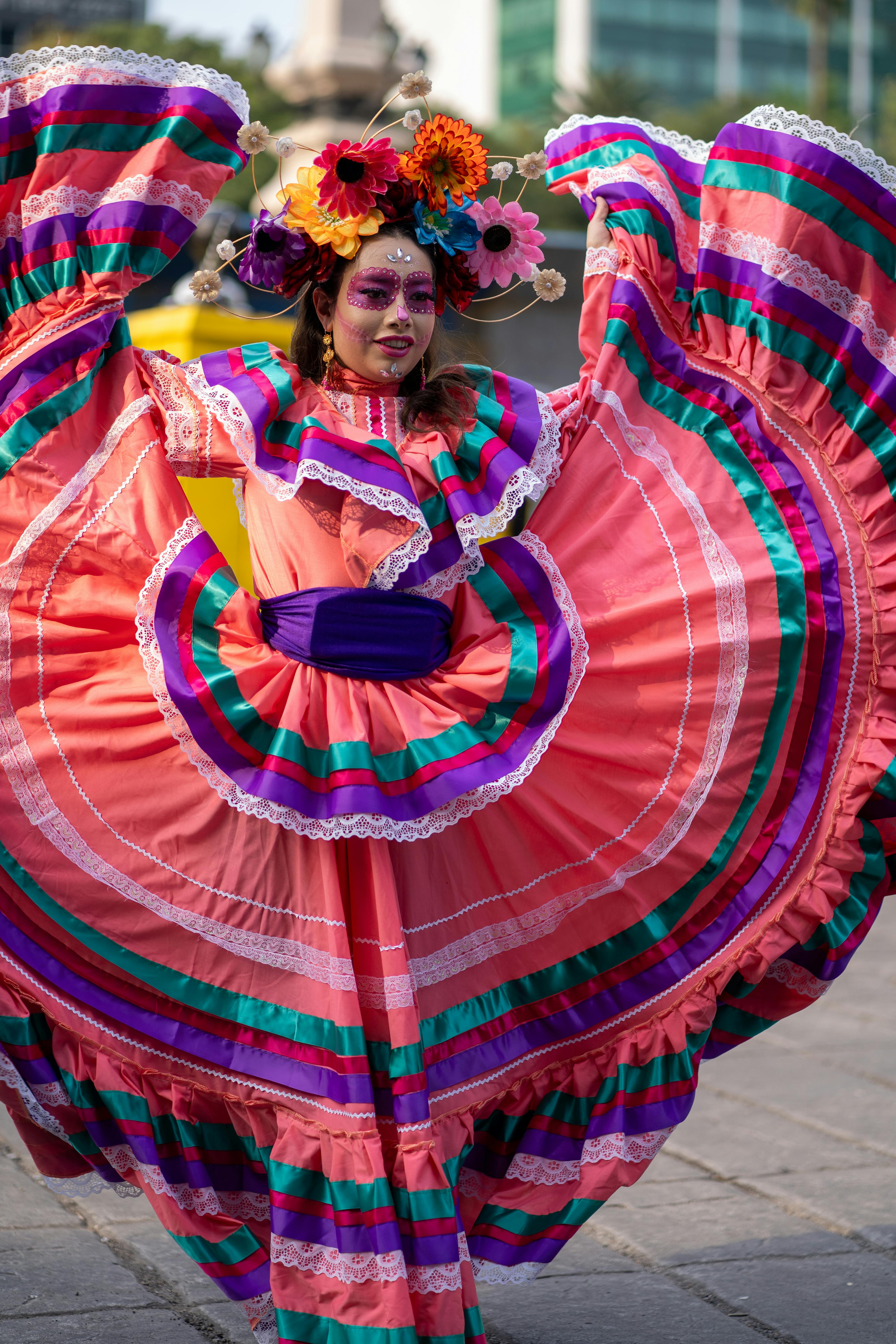 Vibrant Mexican Catrina Dancer in Traditional Dress · Free Stock Photo
