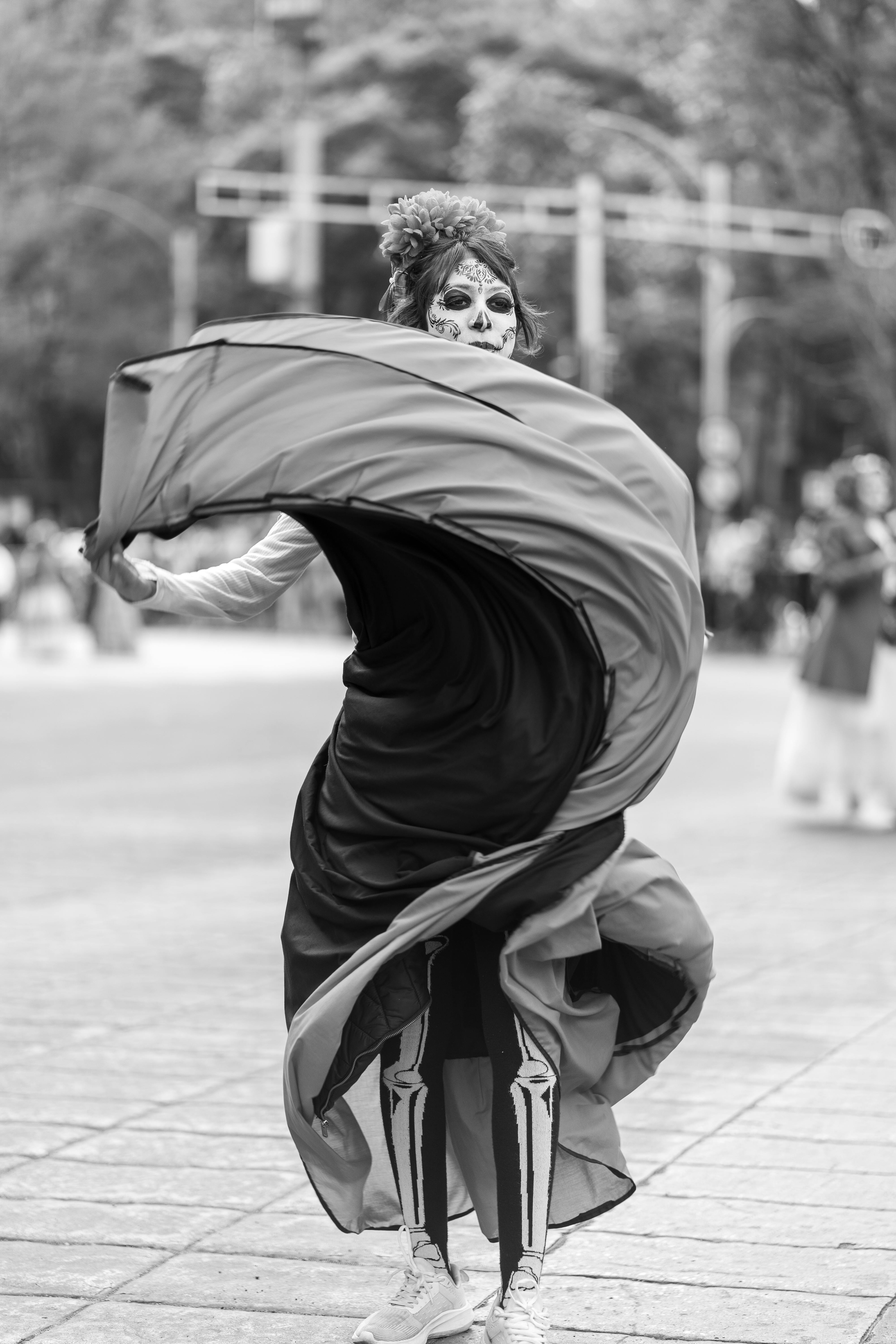 Dynamic Catrina Dancing in Mexico City Street Parade · Free Stock Photo