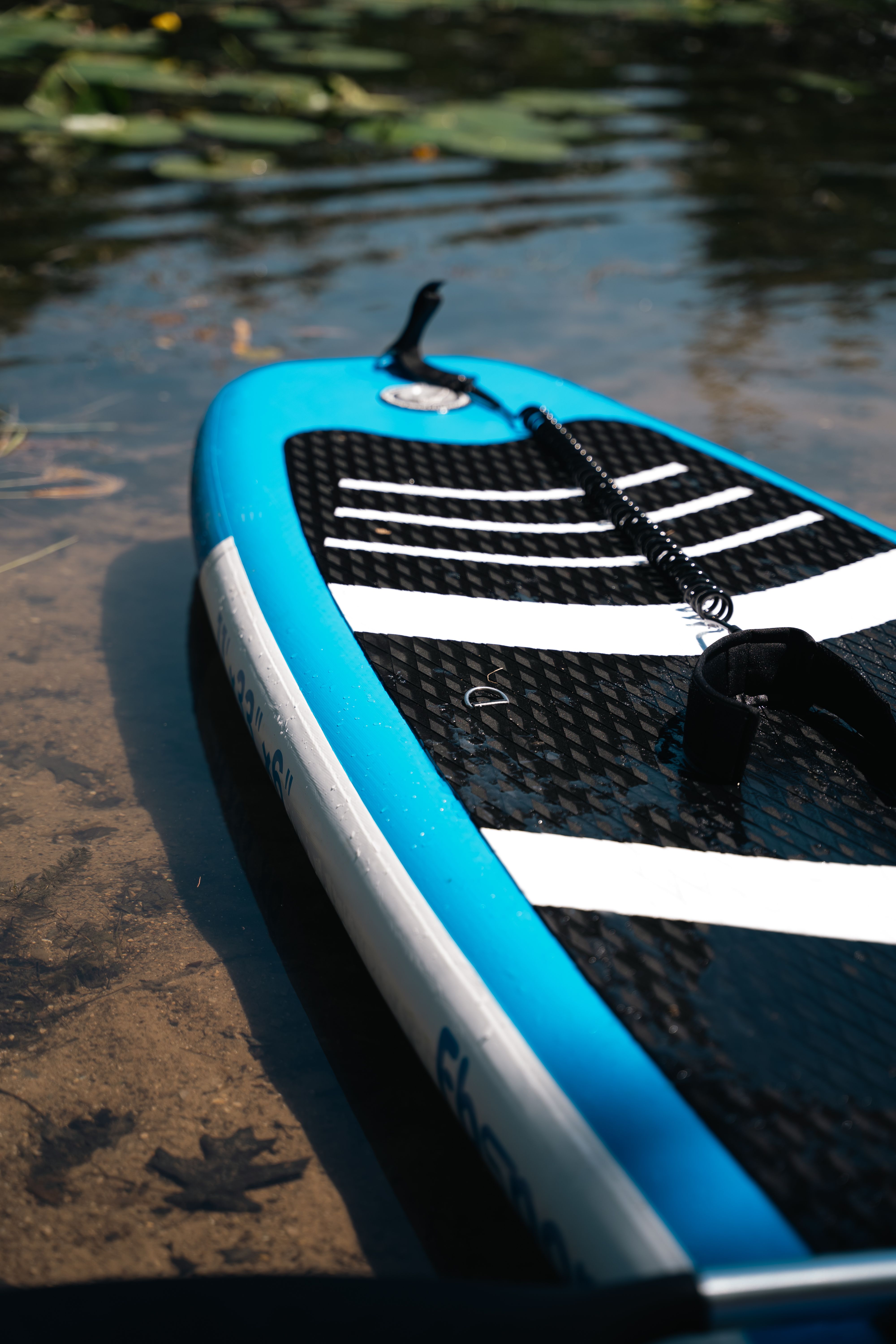 Close-up of Paddleboard by A Calm Lake · Free Stock Photo