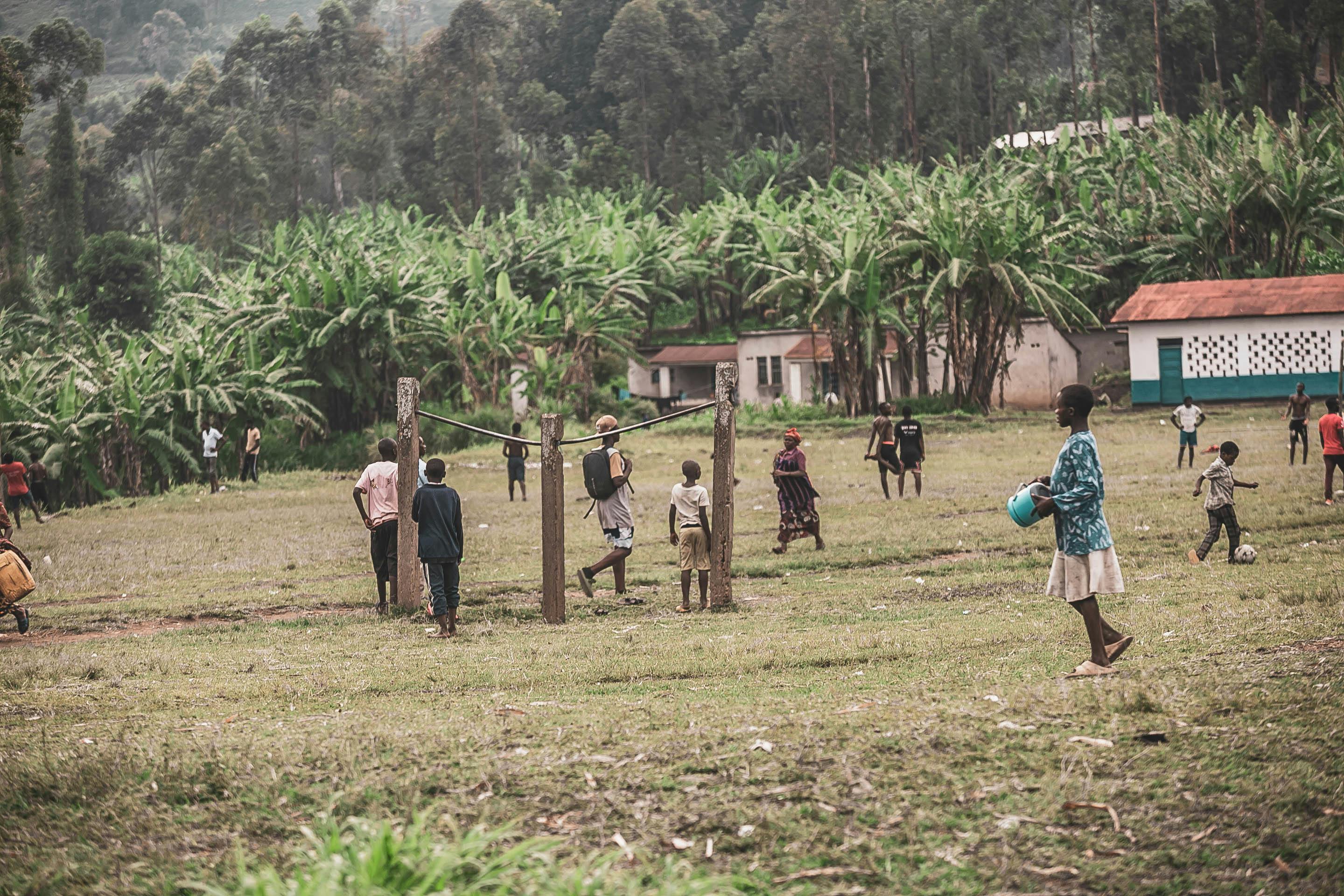 Rural Children Playing Outdoors in a Field · Free Stock Photo