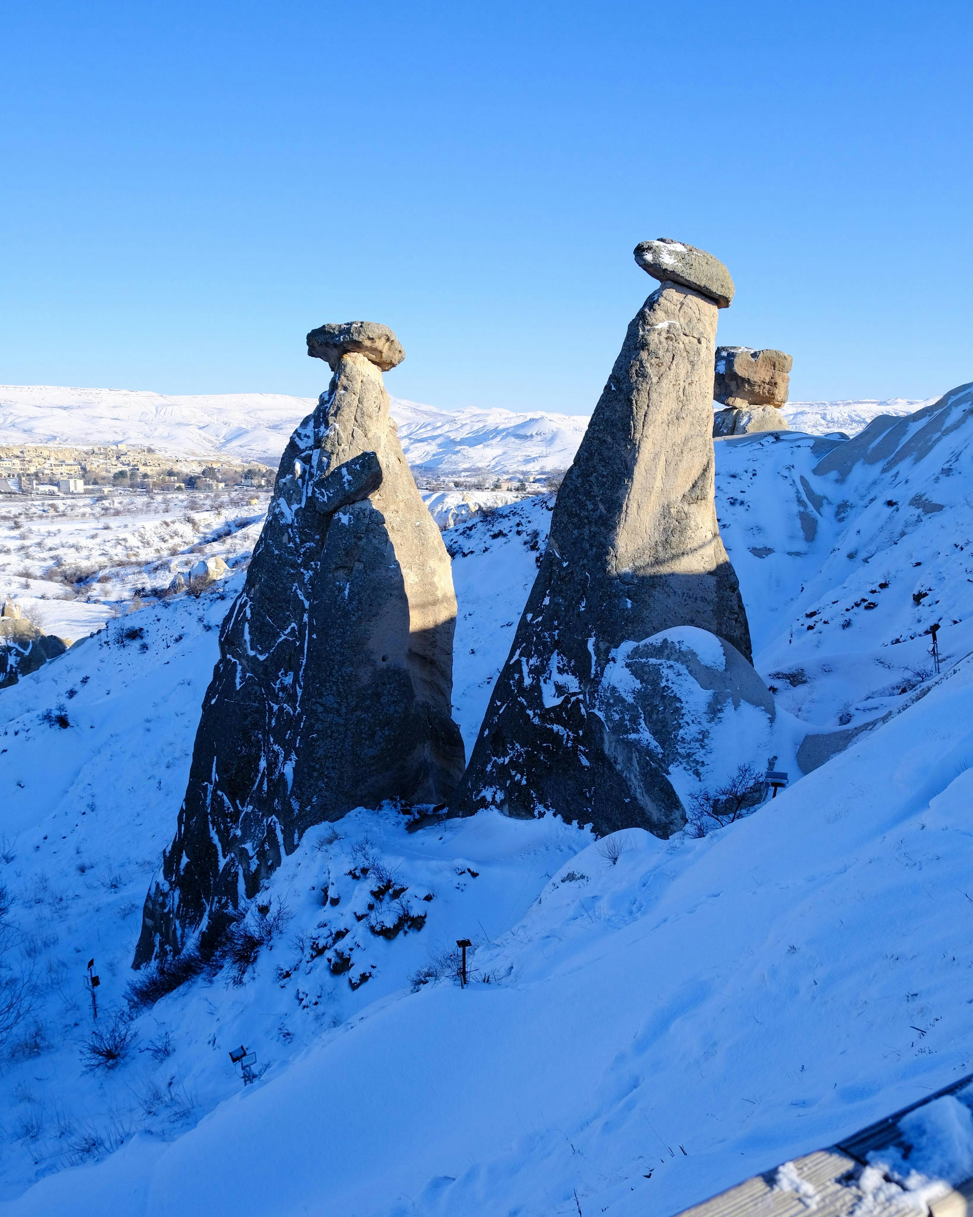 Snow-Capped Fairy Chimneys in Cappadocia · Free Stock Photo