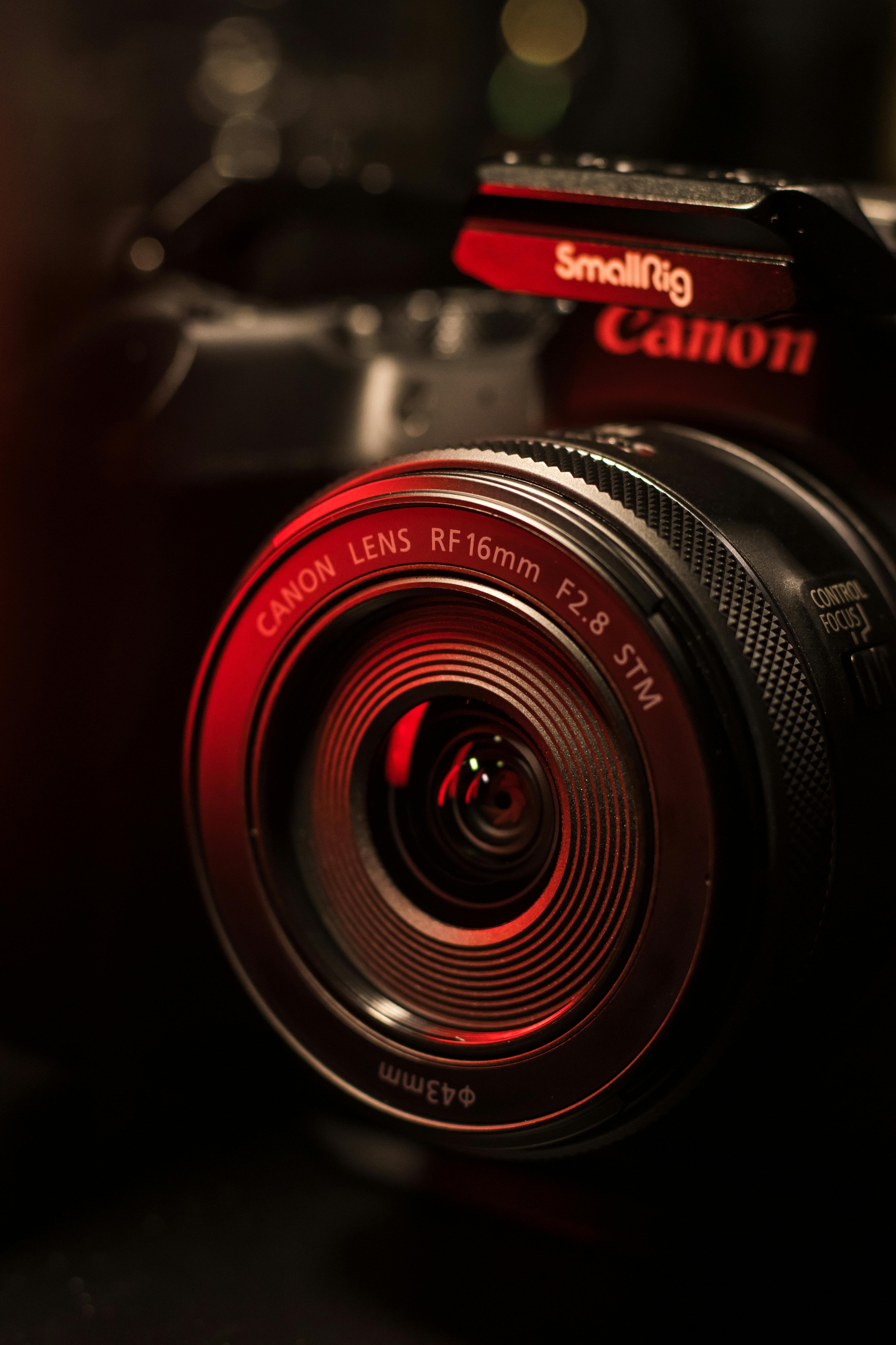 Close-up of Camera Lens with Red Lighting Effect · Free Stock Photo