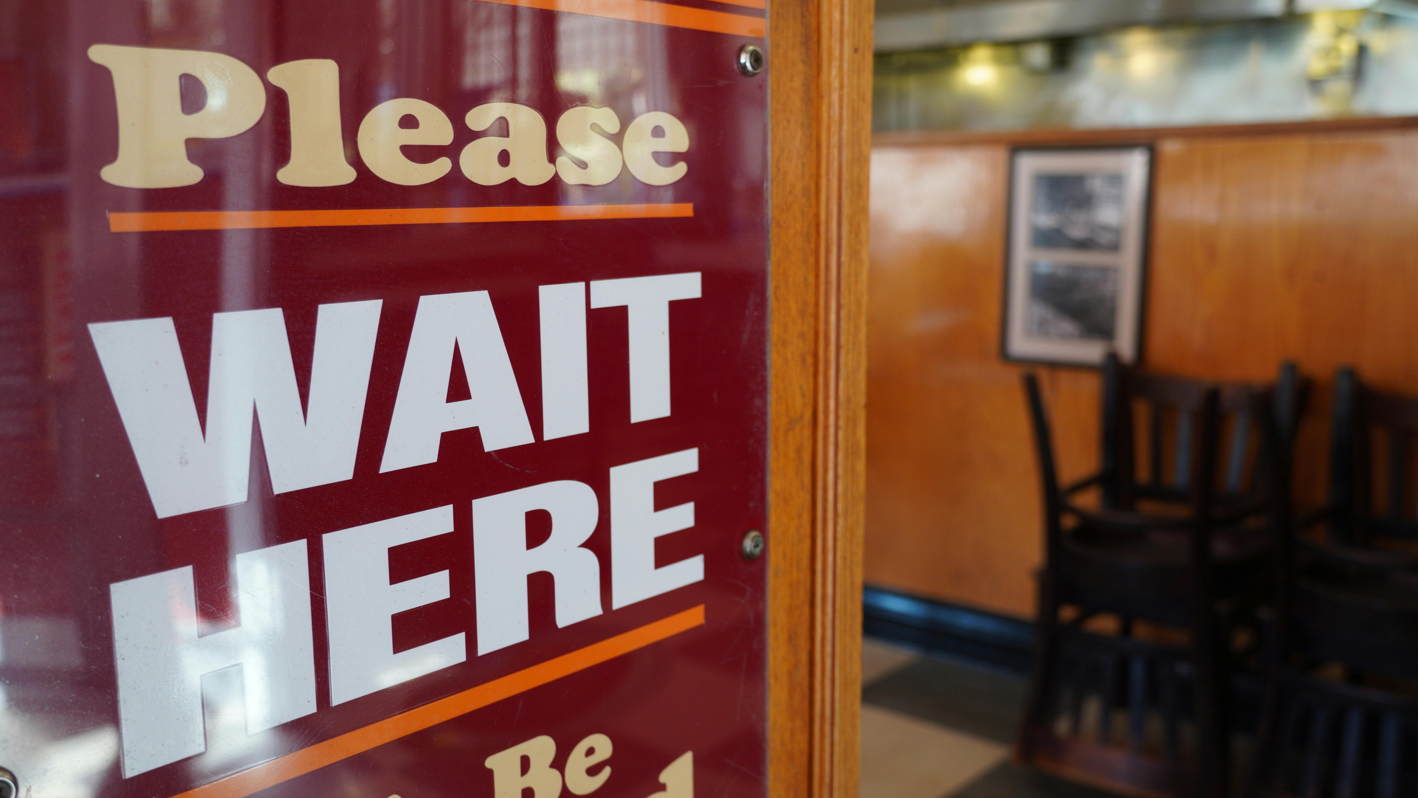 Restaurant Entrance Signage 'Please Wait Here' · Free Stock Photo