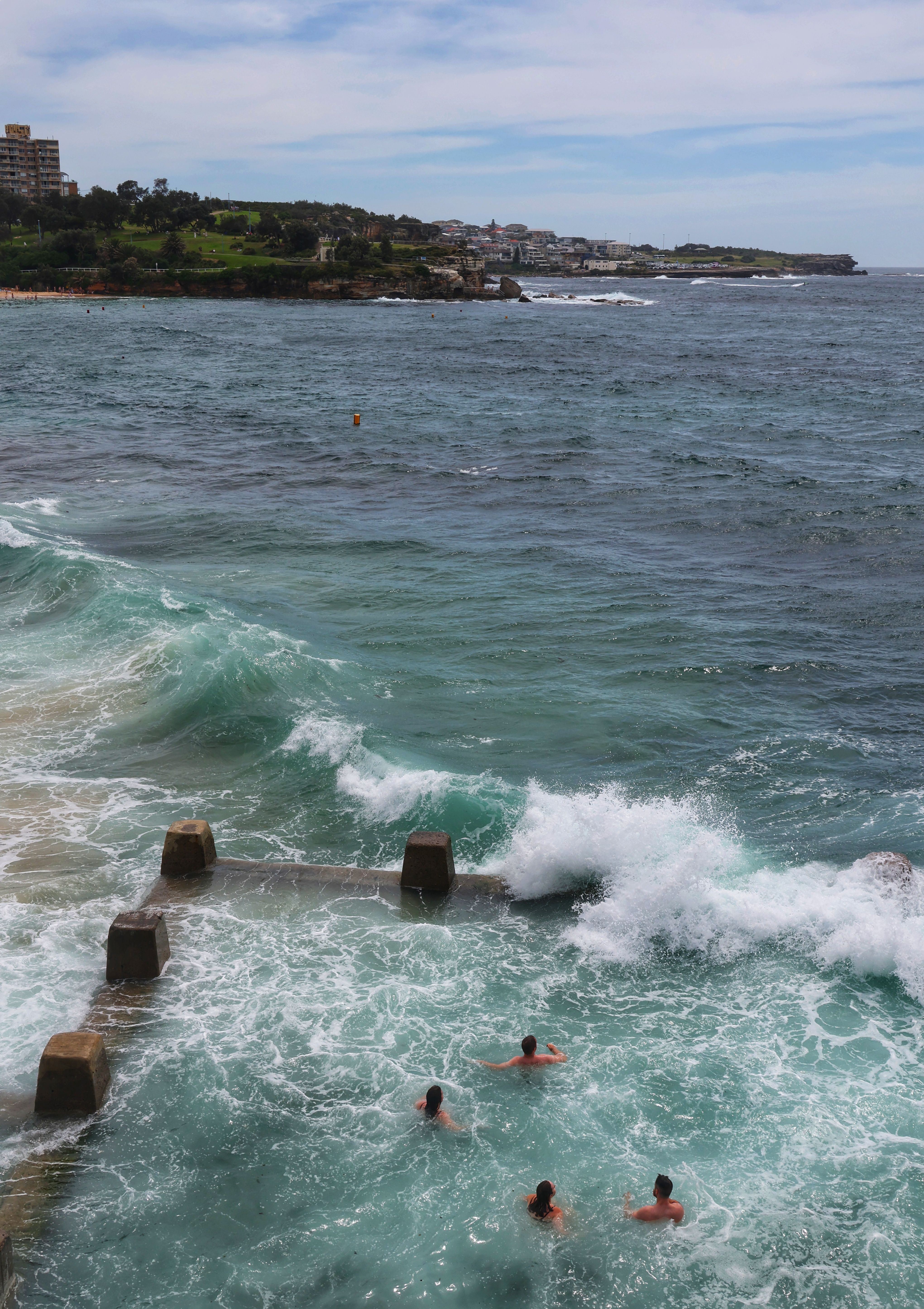 Swimmers in Ocean Pool at Scenic Coastline · Free Stock Photo
