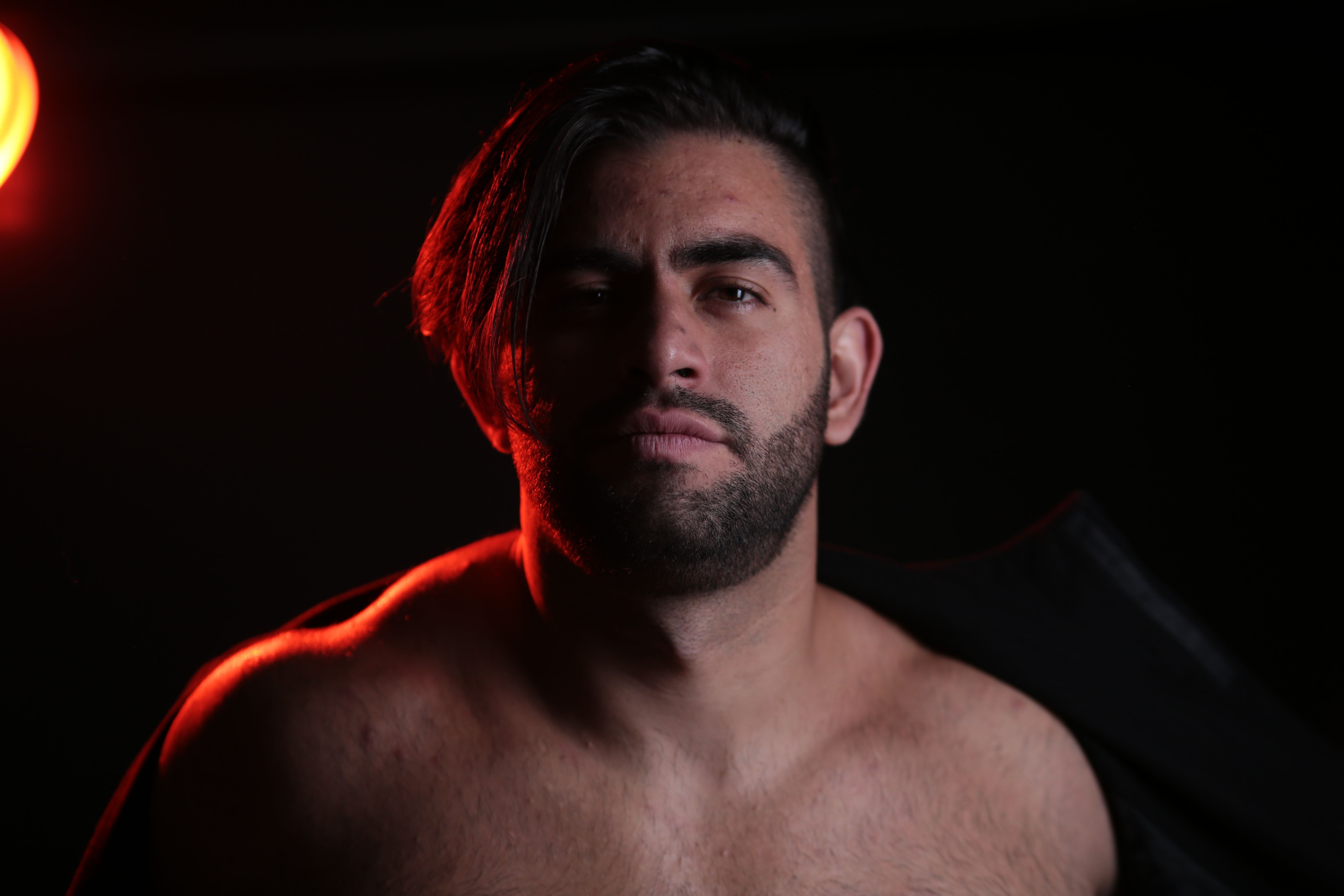 Dramatic Portrait of a Man with Red Lighting · Free Stock Photo