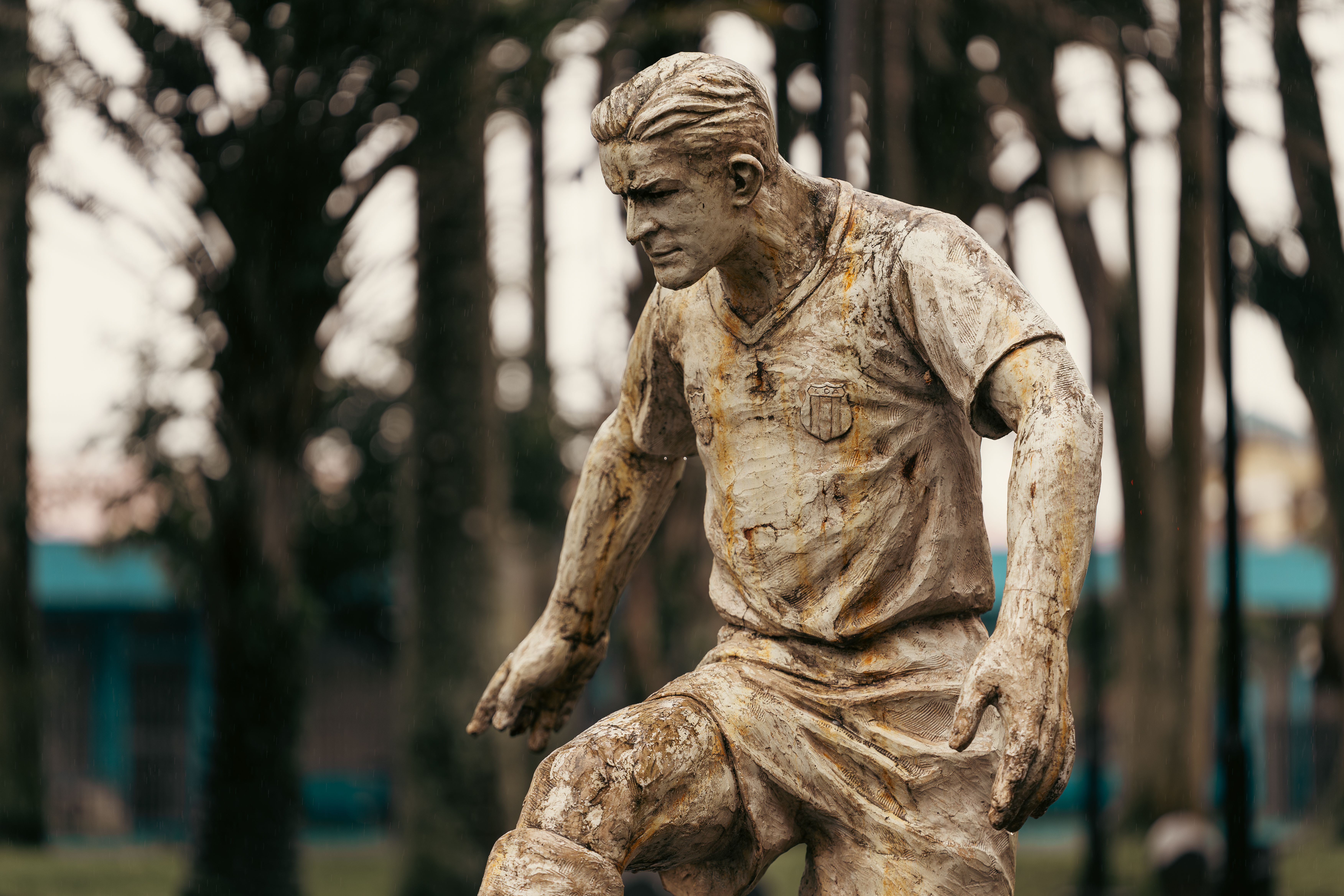 Rustic Soccer Player Statue in Alajuela Park · Free Stock Photo