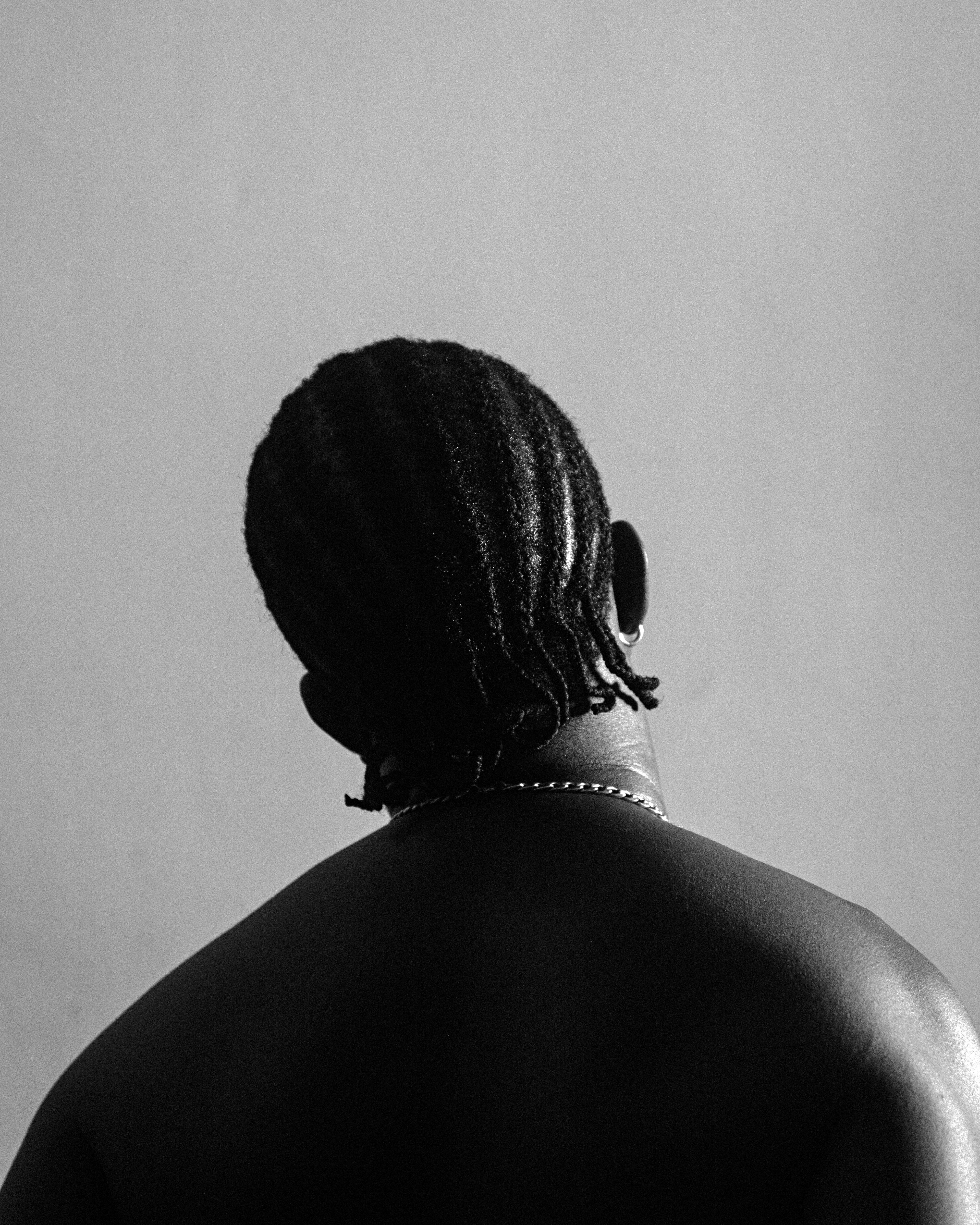 Black and White Portrait with Cornrows · Free Stock Photo
