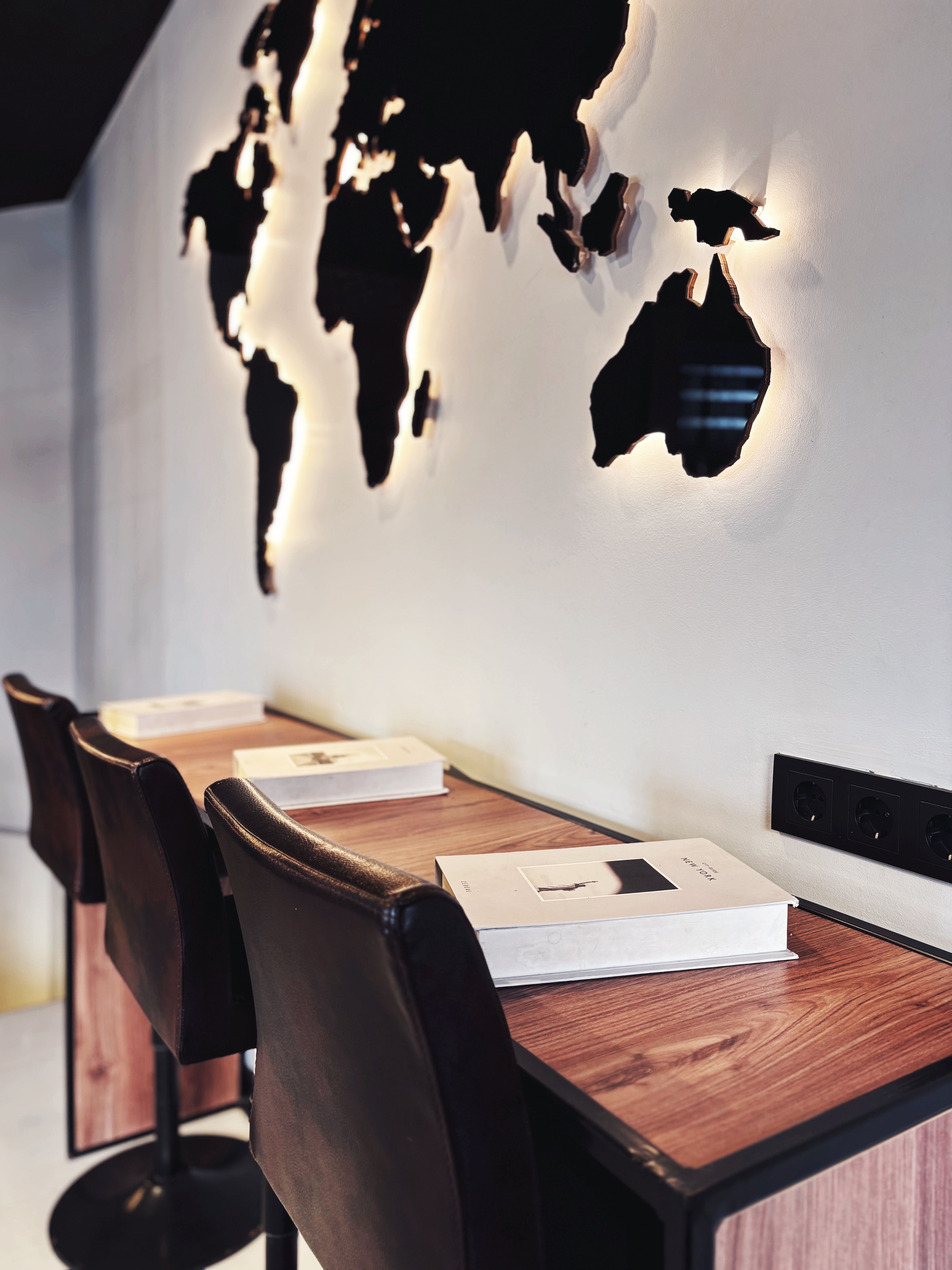 Modern Workspace with World Map Decor · Free Stock Photo