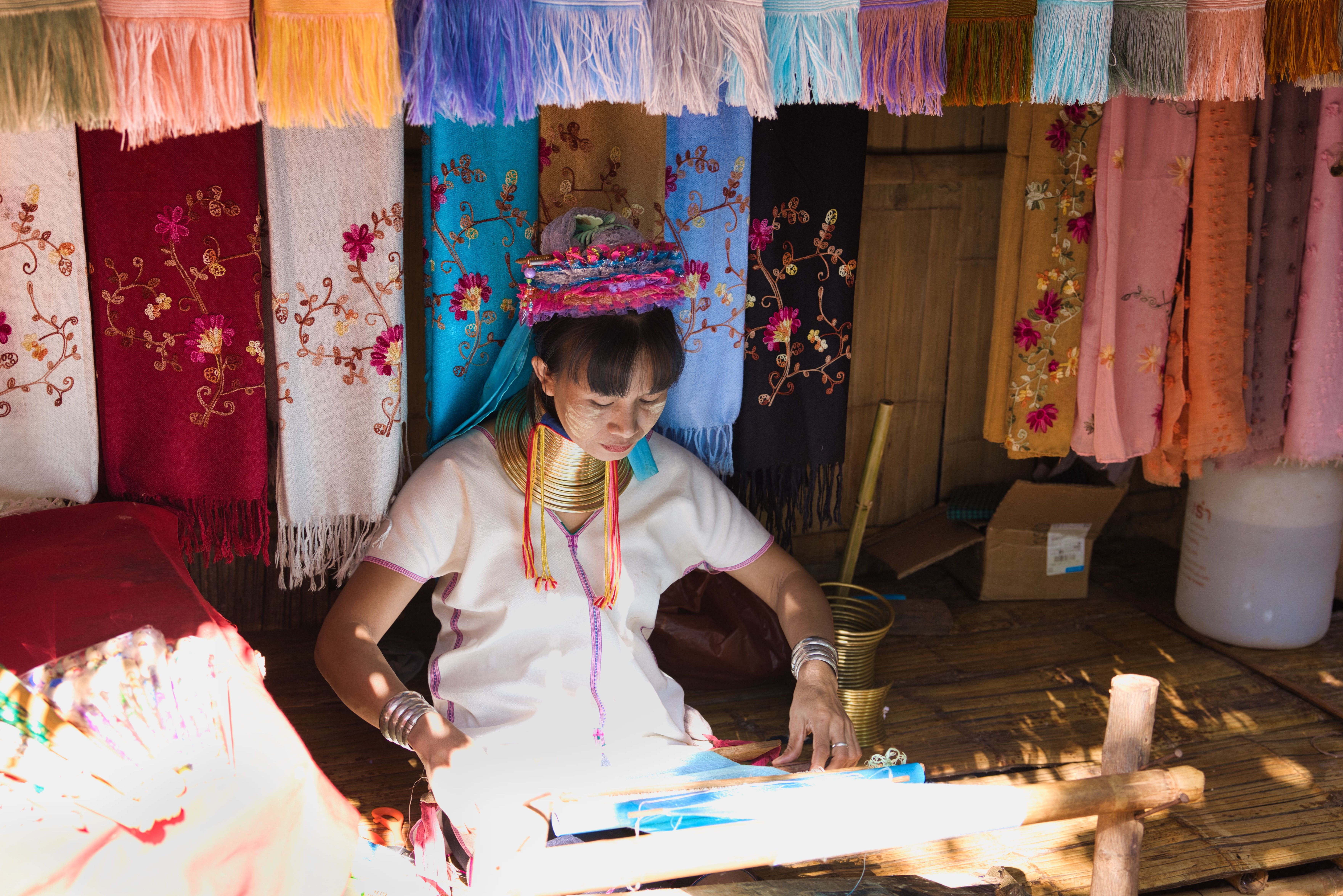 Traditional Craftsmanship of Long Neck Karen Woman · Free Stock Photo