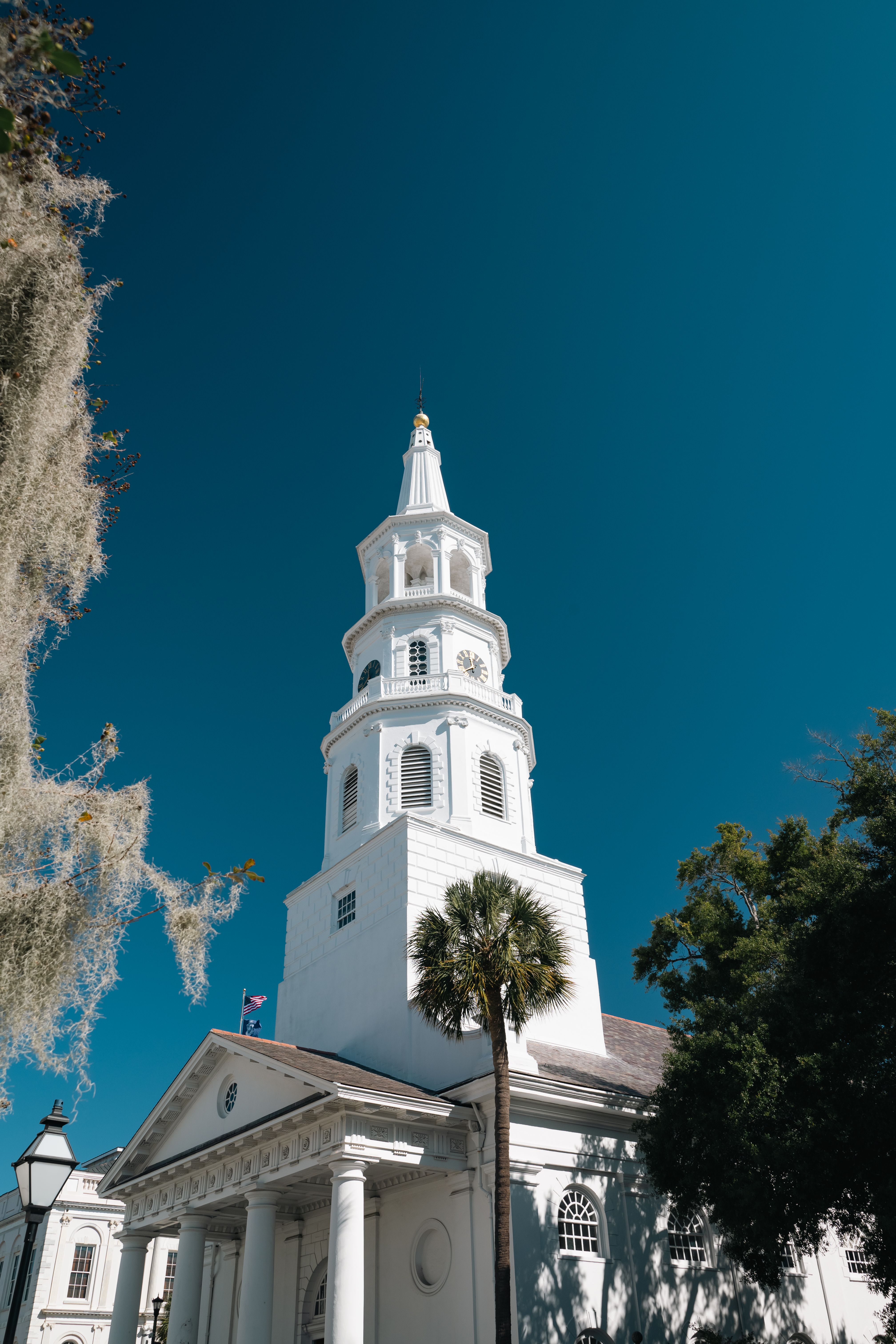 Historic White Church with Blue Sky Background · Free Stock Photo