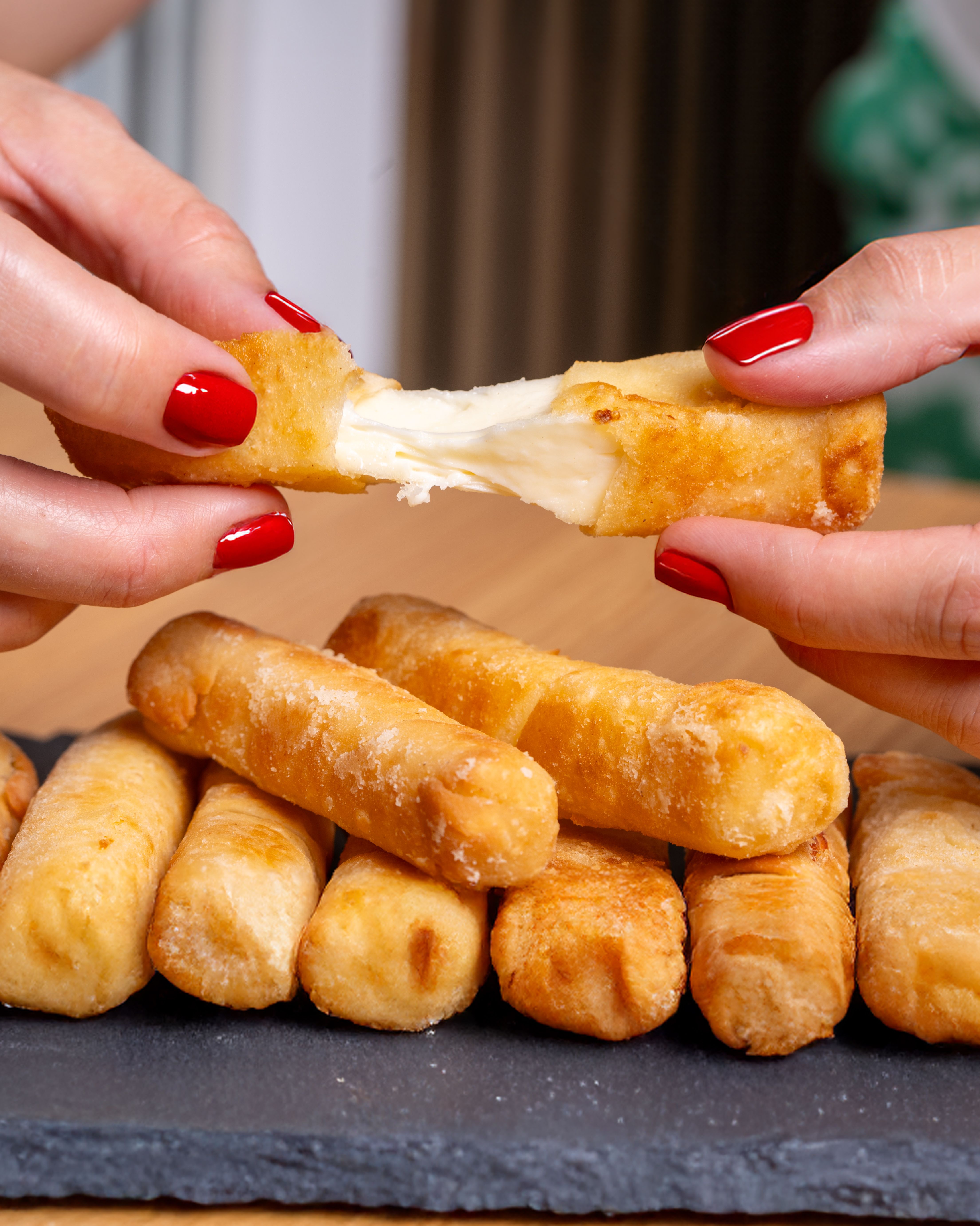 Cheese Sticks with Red Nail Polish Close-up · Free Stock Photo