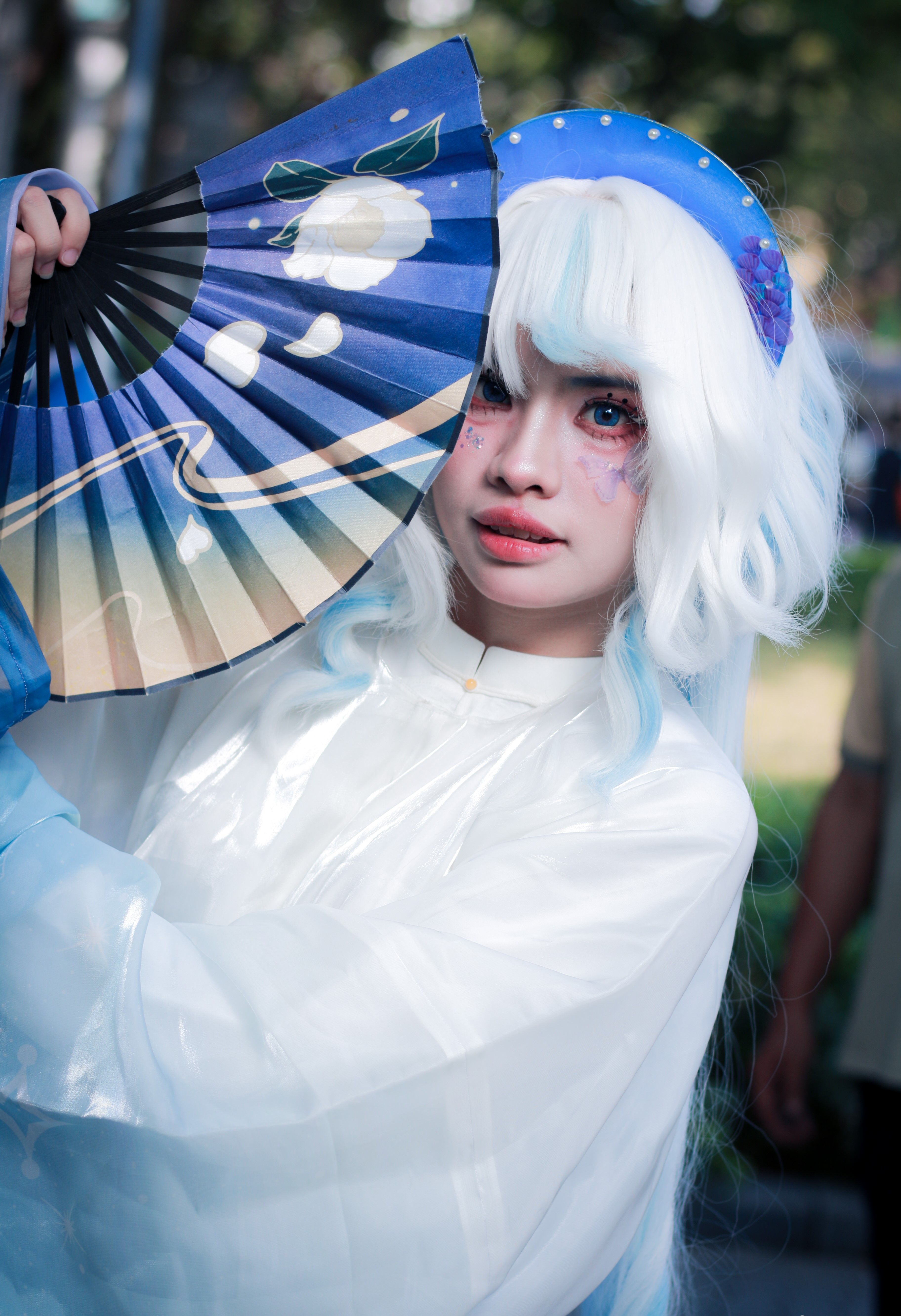 Captivating Anime Cosplay with Fan Prop · Free Stock Photo