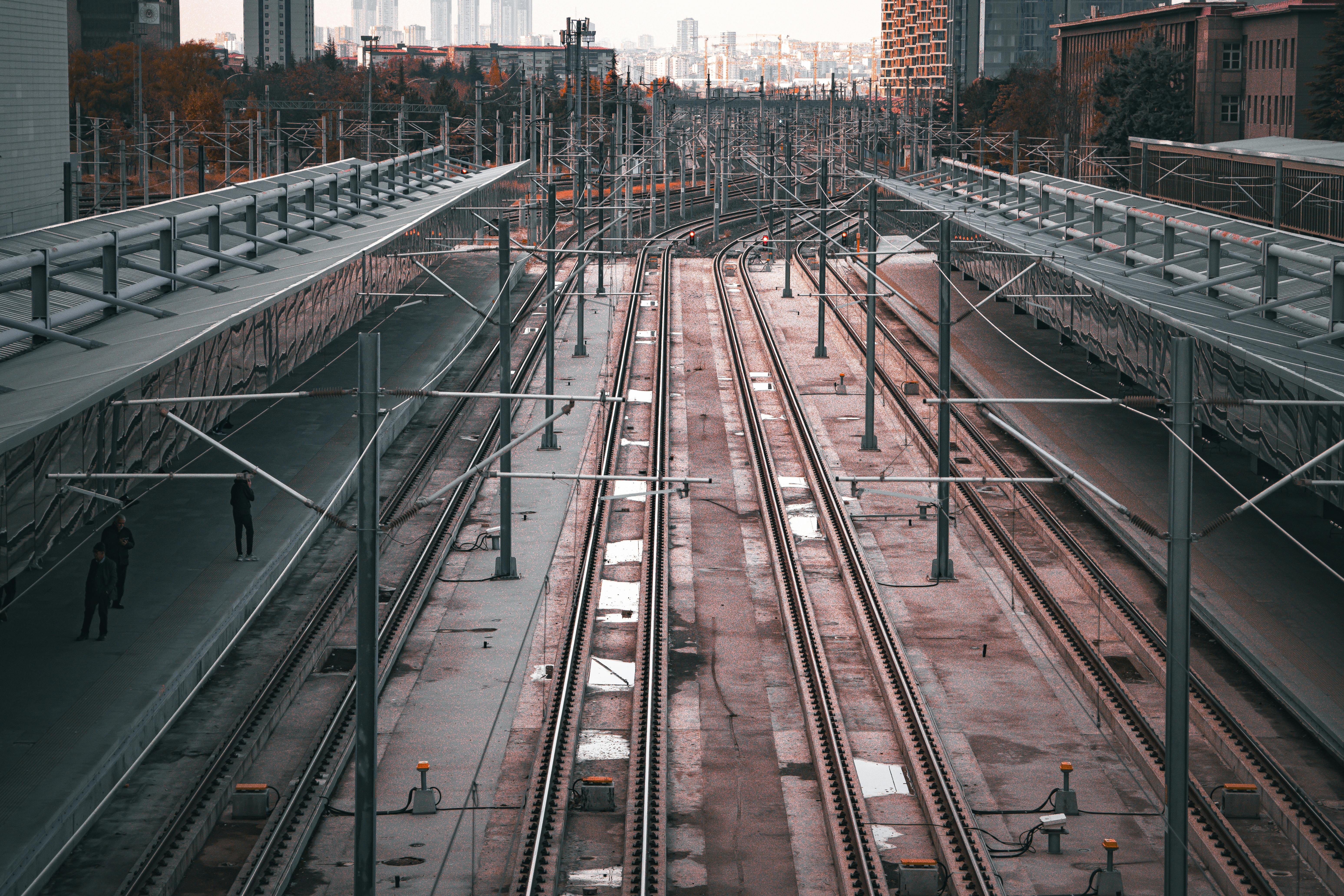 Urban Railway Station Perspective at Dusk · Free Stock Photo