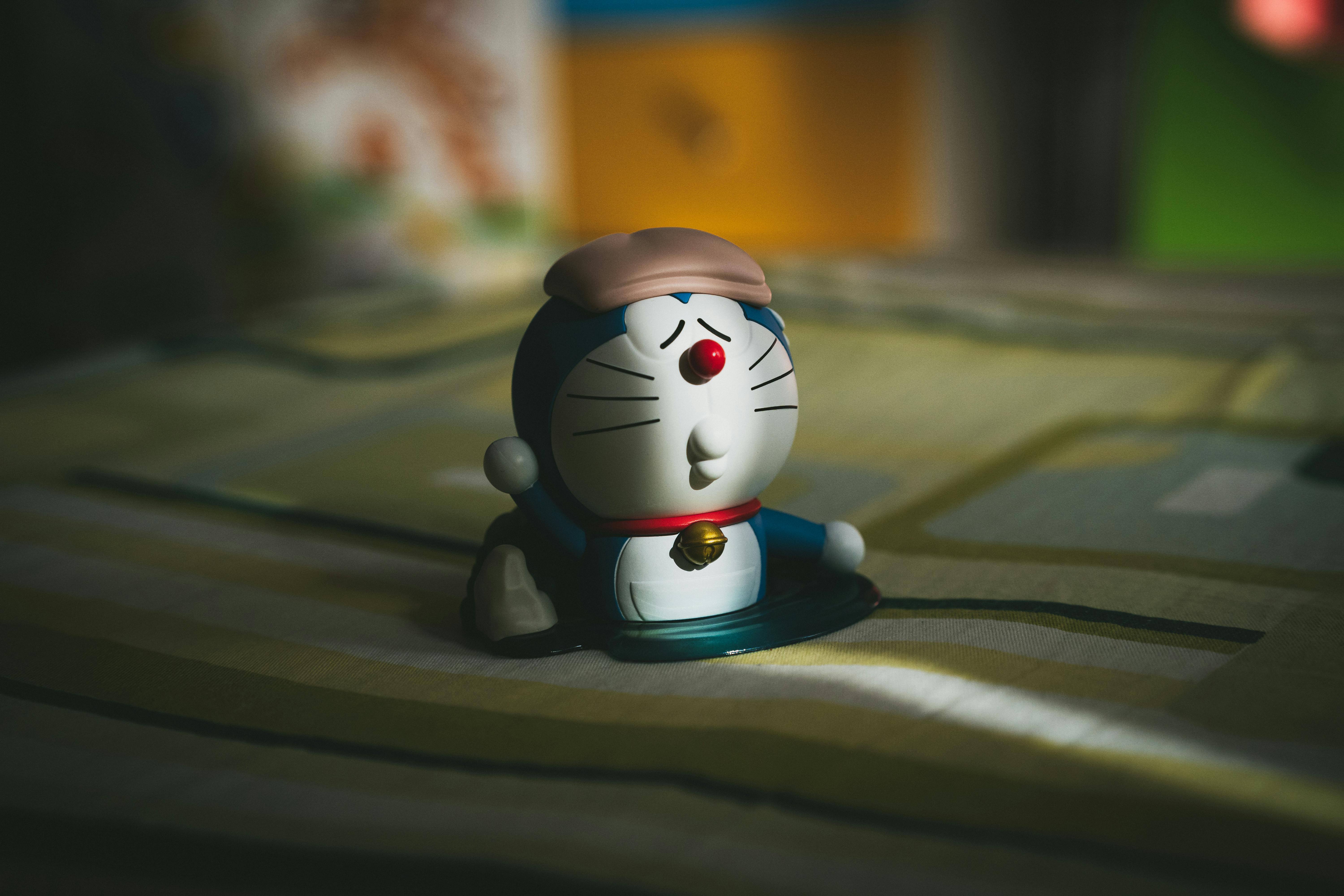 Doraemon Figurine in Soft Light with Shadow · Free Stock Photo