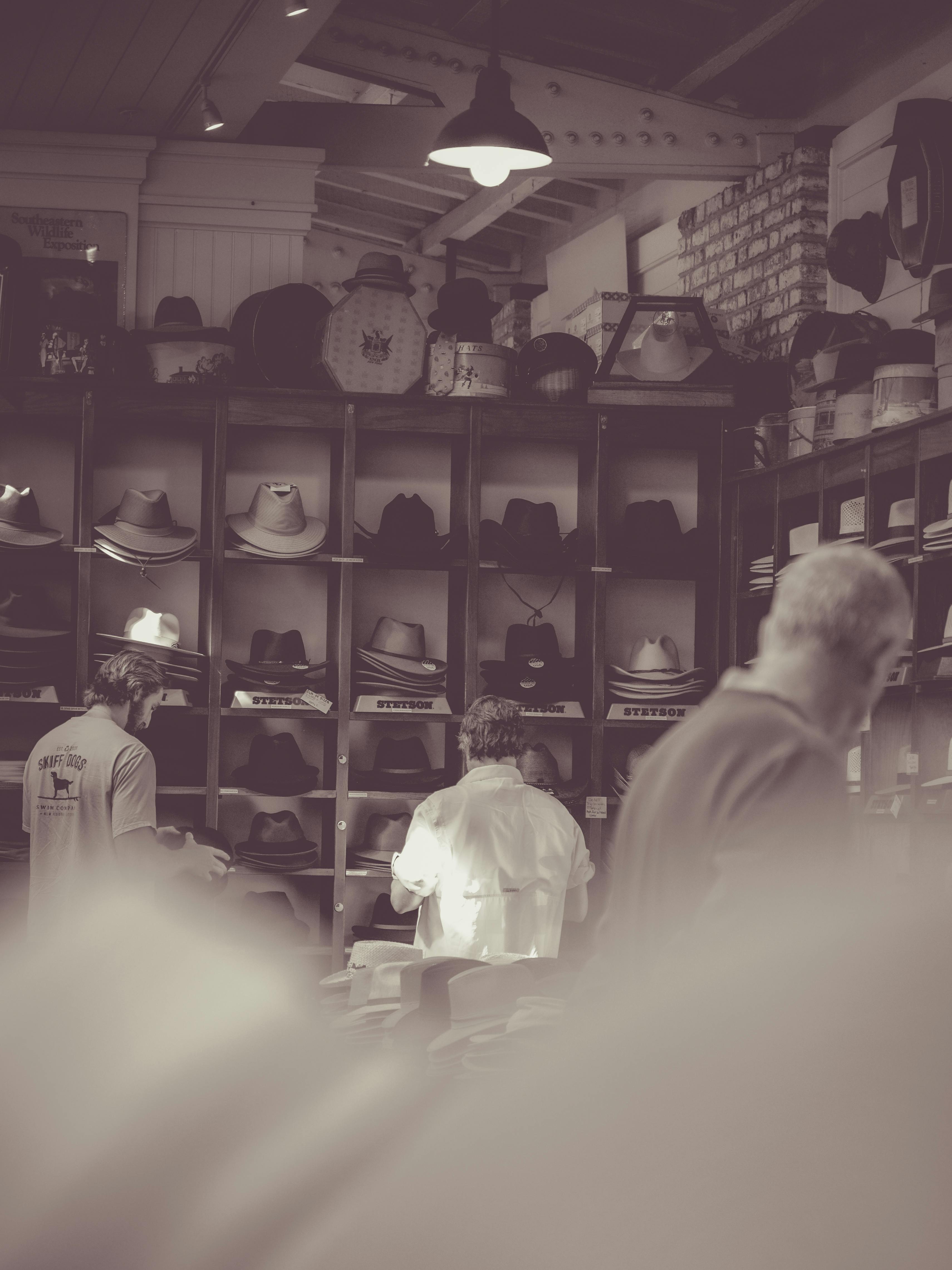 Group of People Standing in Store · Free Stock Photo