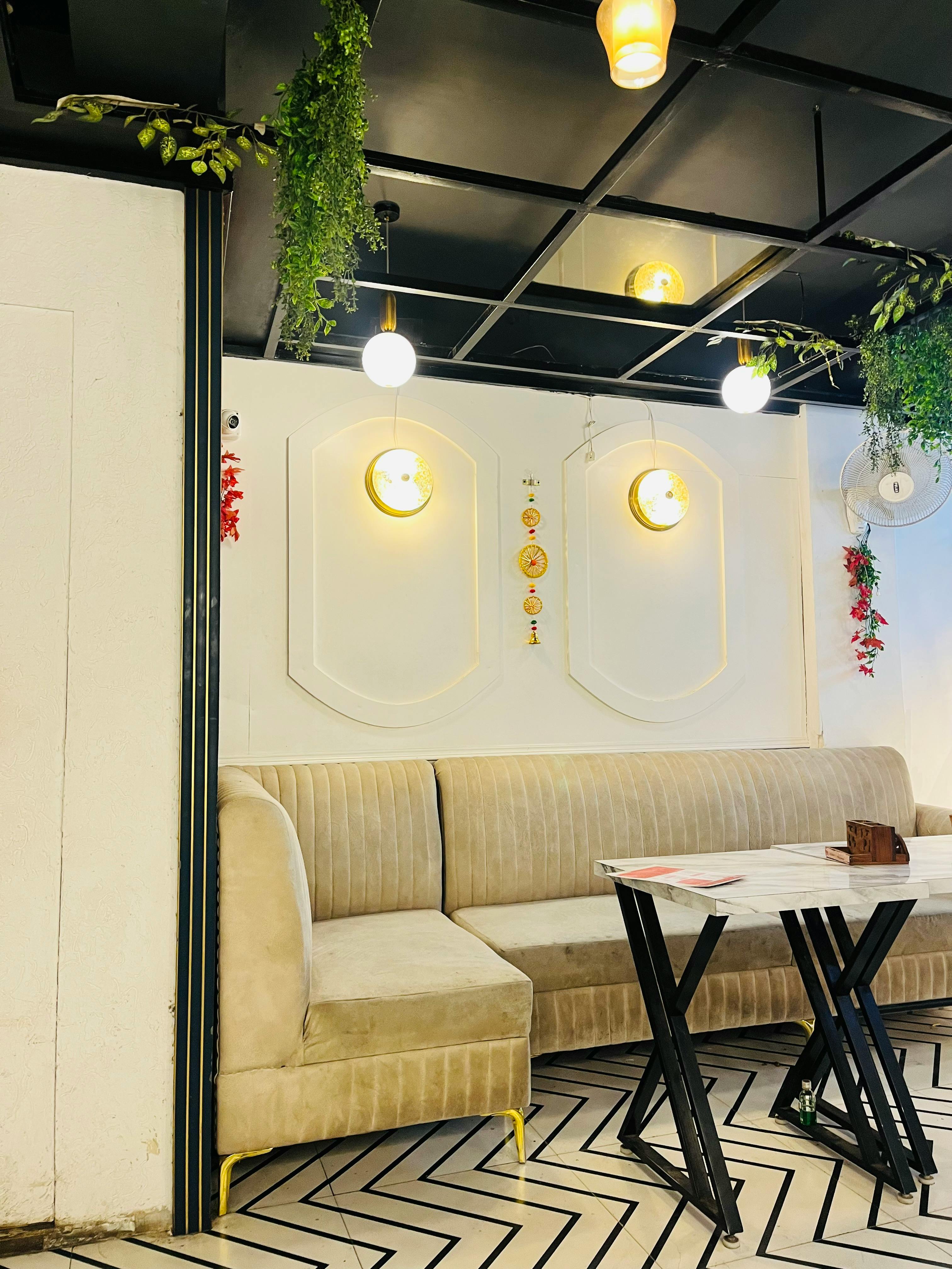 Cozy Modern Indoor Cafe Seating Area · Free Stock Photo