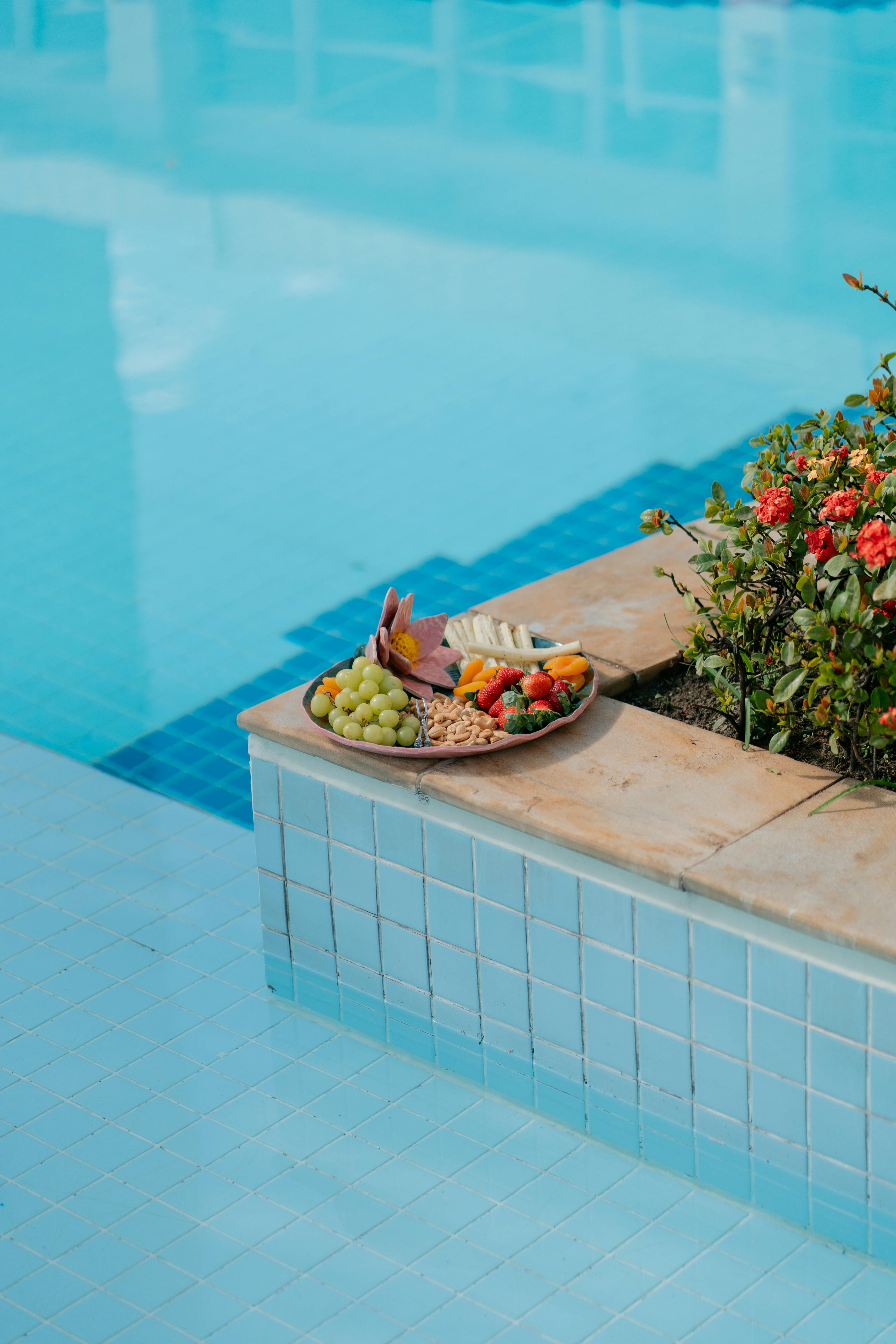 Vibrant Fruit Platter by Poolside in Summer · Free Stock Photo