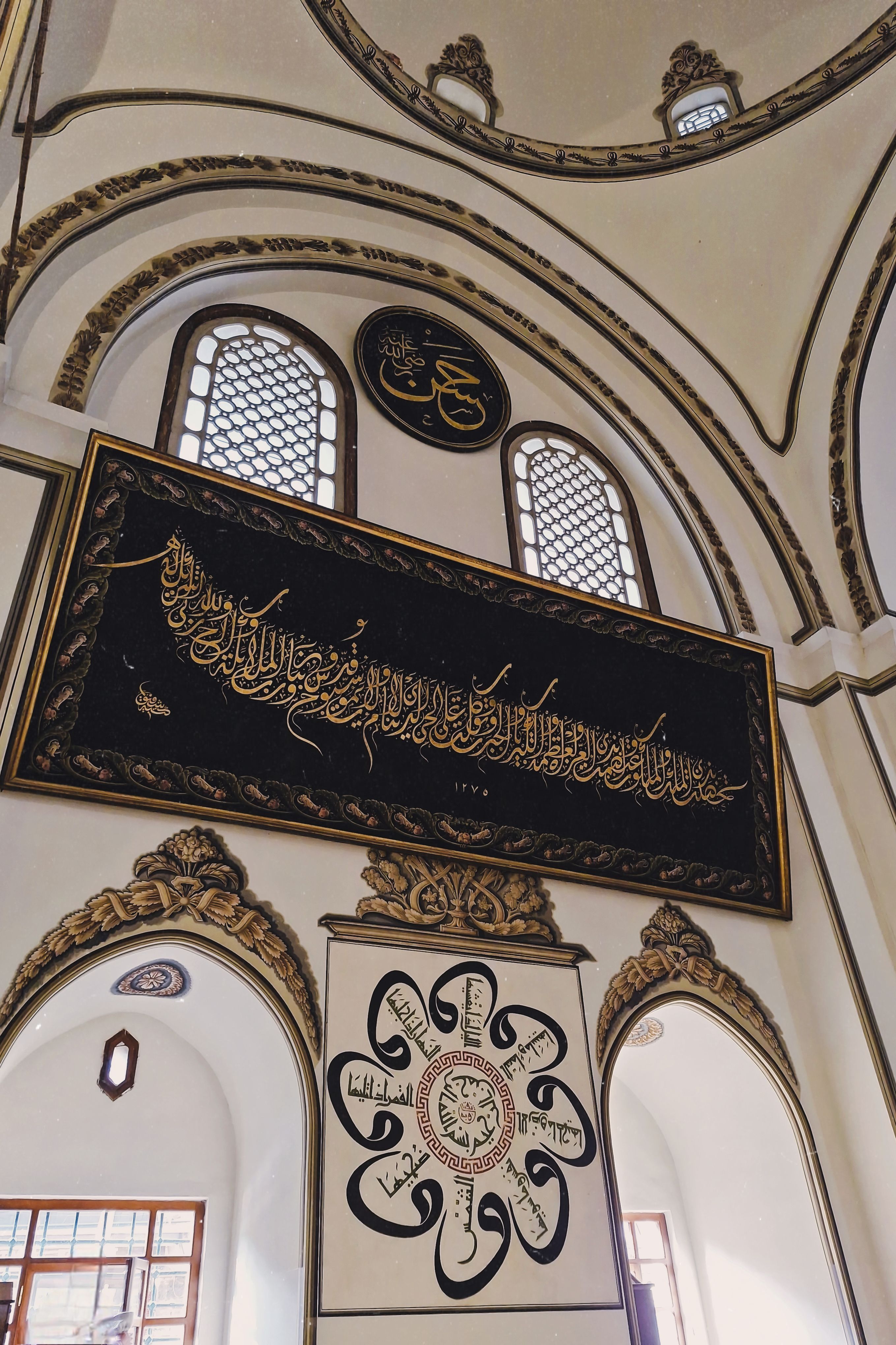 Intricate Islamic Calligraphy in Mosque Interior · Free Stock Photo