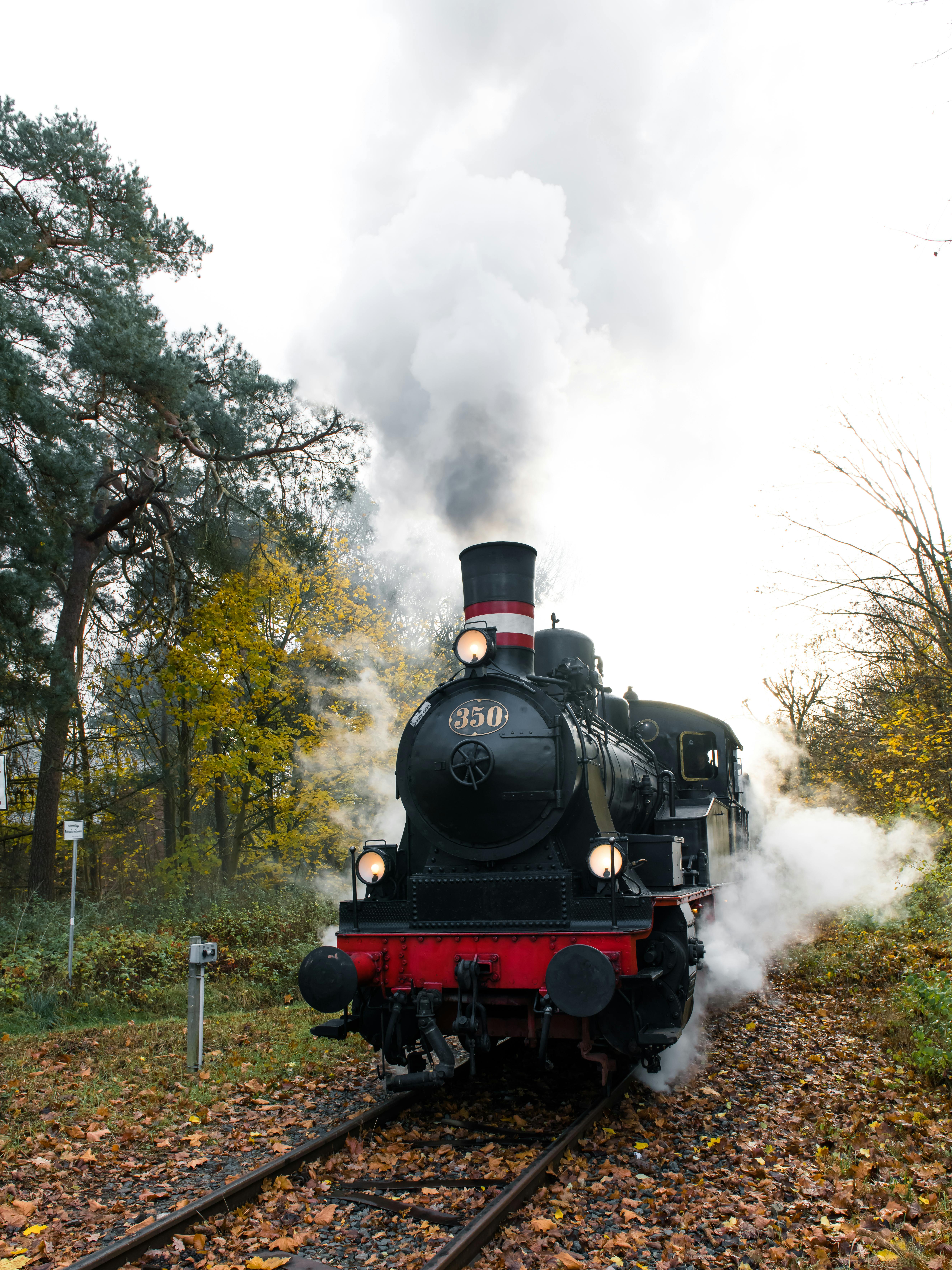 Historic Steam Train in Fall Landscape · Free Stock Photo